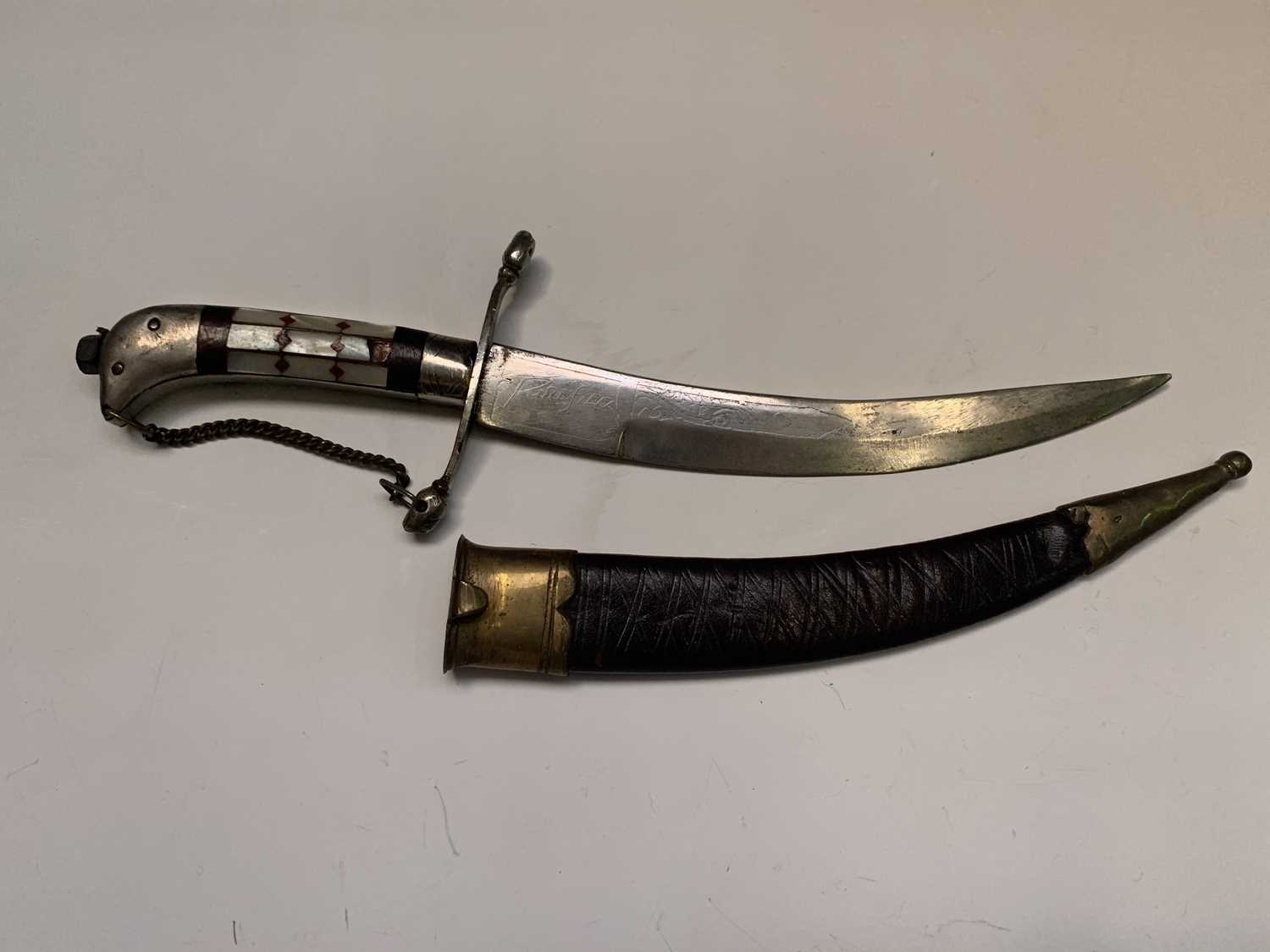 Lot 359 - An Eastern dagger, with mother of pearl and