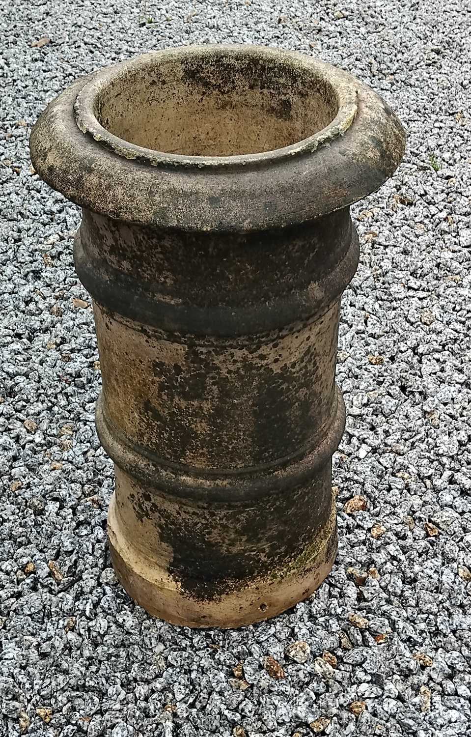 Lot 750 - A buff-coloured, rib-banded, chimney pot of