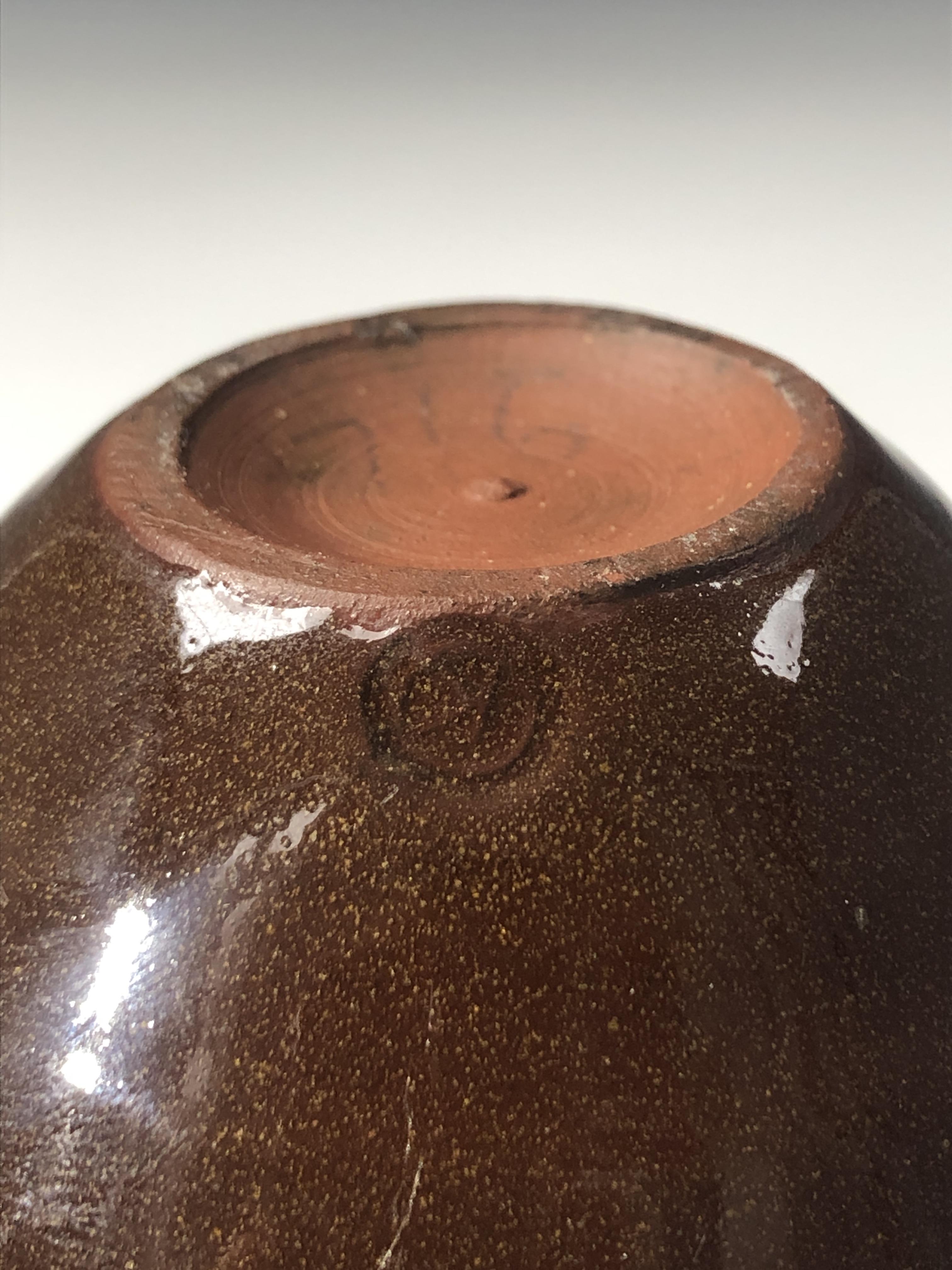 Lot 398 - A Kenneth Quick tenmoku glazed bud vase,