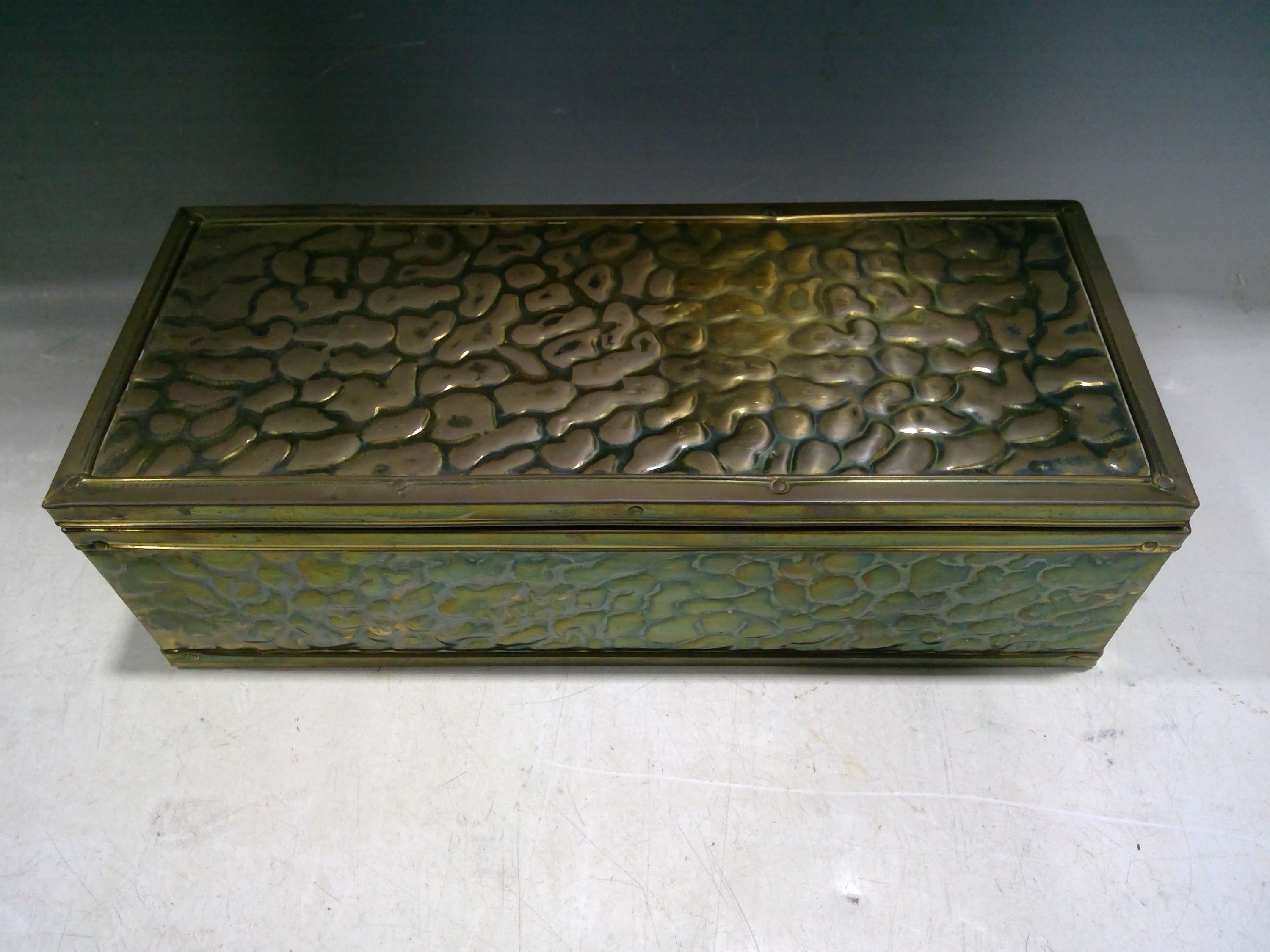 Lot 26 - A Hammered Brass Box, a Navajo Sand Painted