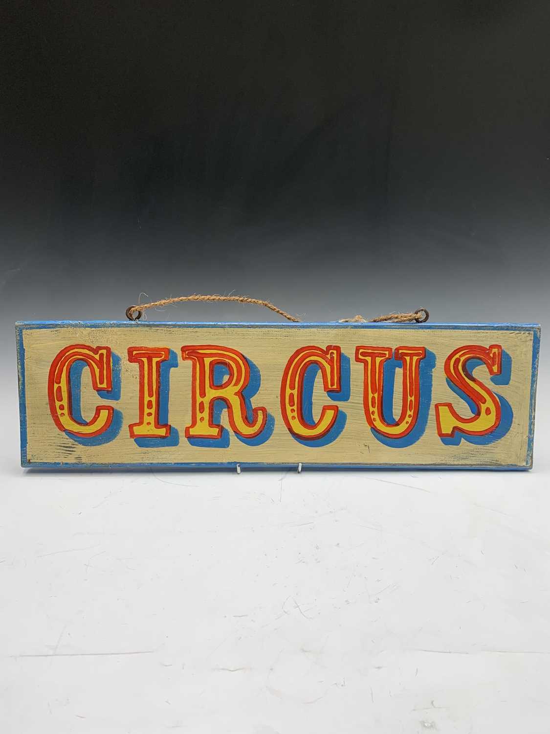 Lot 273 - A sign written wooden sign 'Circus'. 19 x