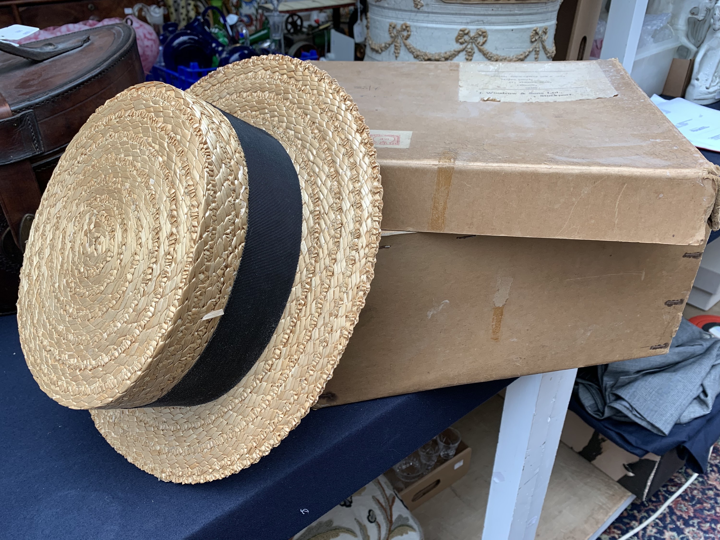 Lot 2842 - A classic straw boater size 73/8 (60). In a