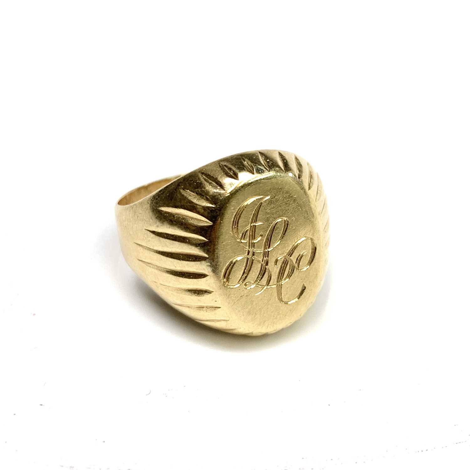 Lot 2308 - A gold signet ring monogrammed JLC within a