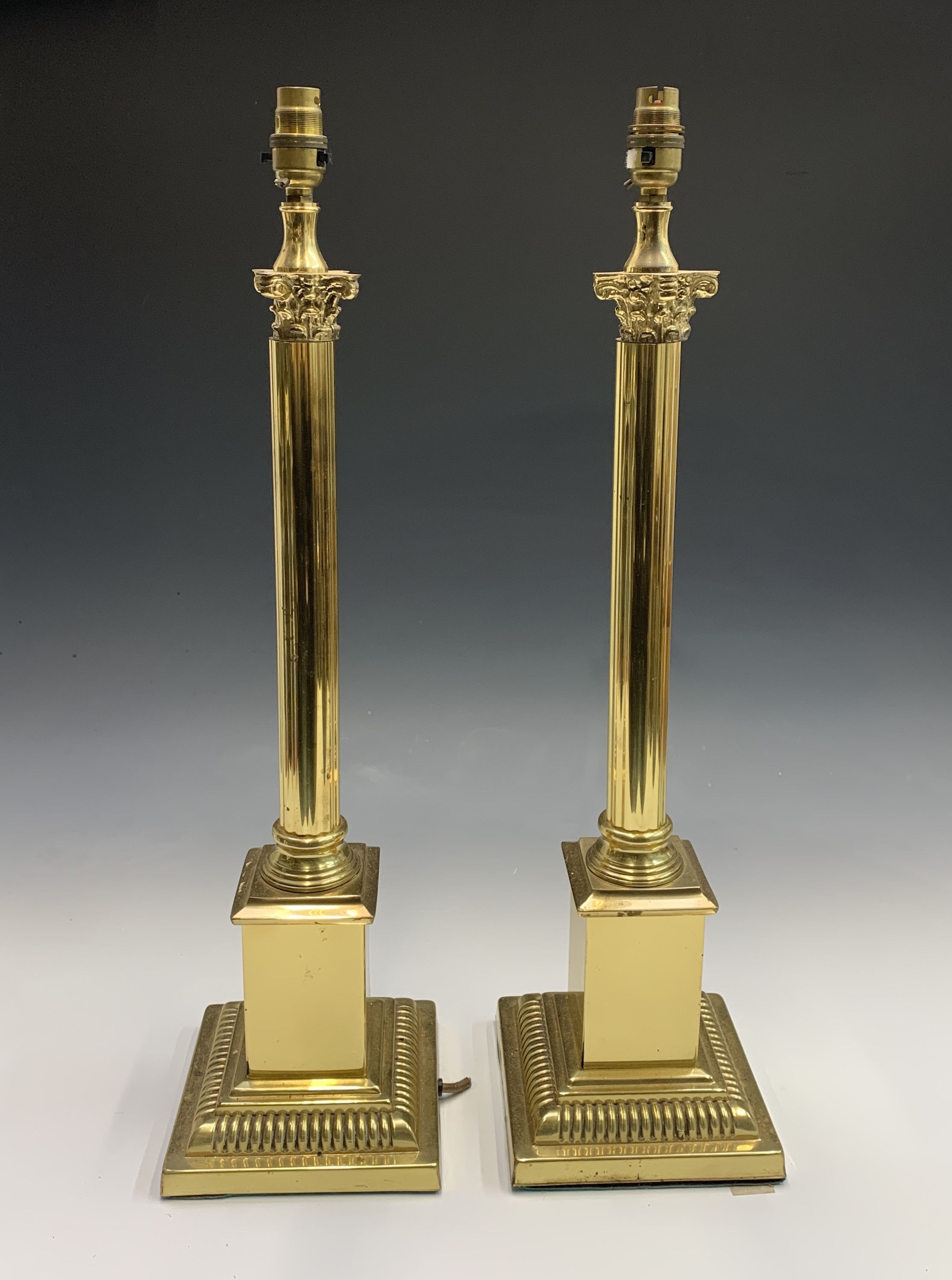 Lot 15 - A pair of brass effect corinthian column