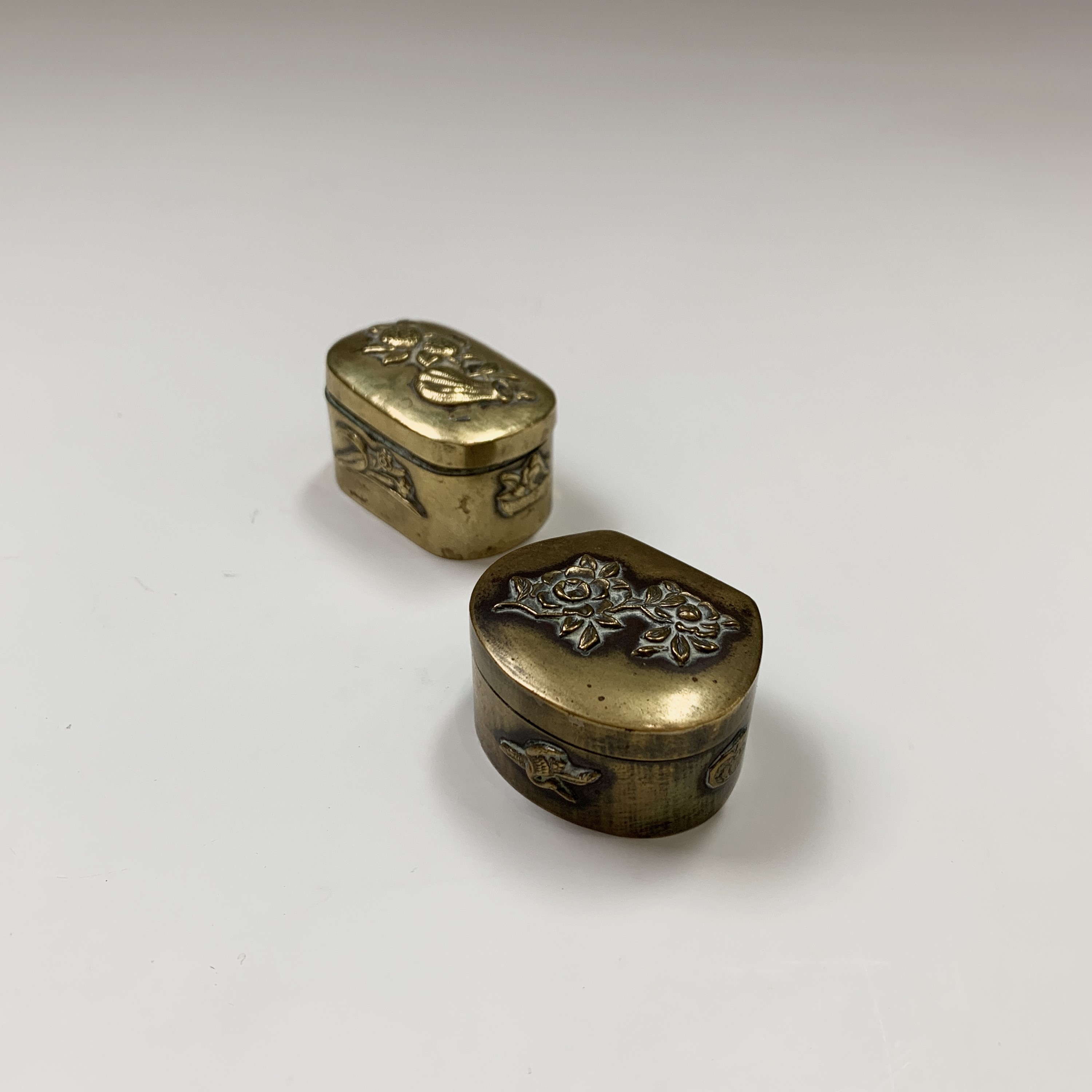 Lot 150 - Two Japanese brass pill boxes, early 20th