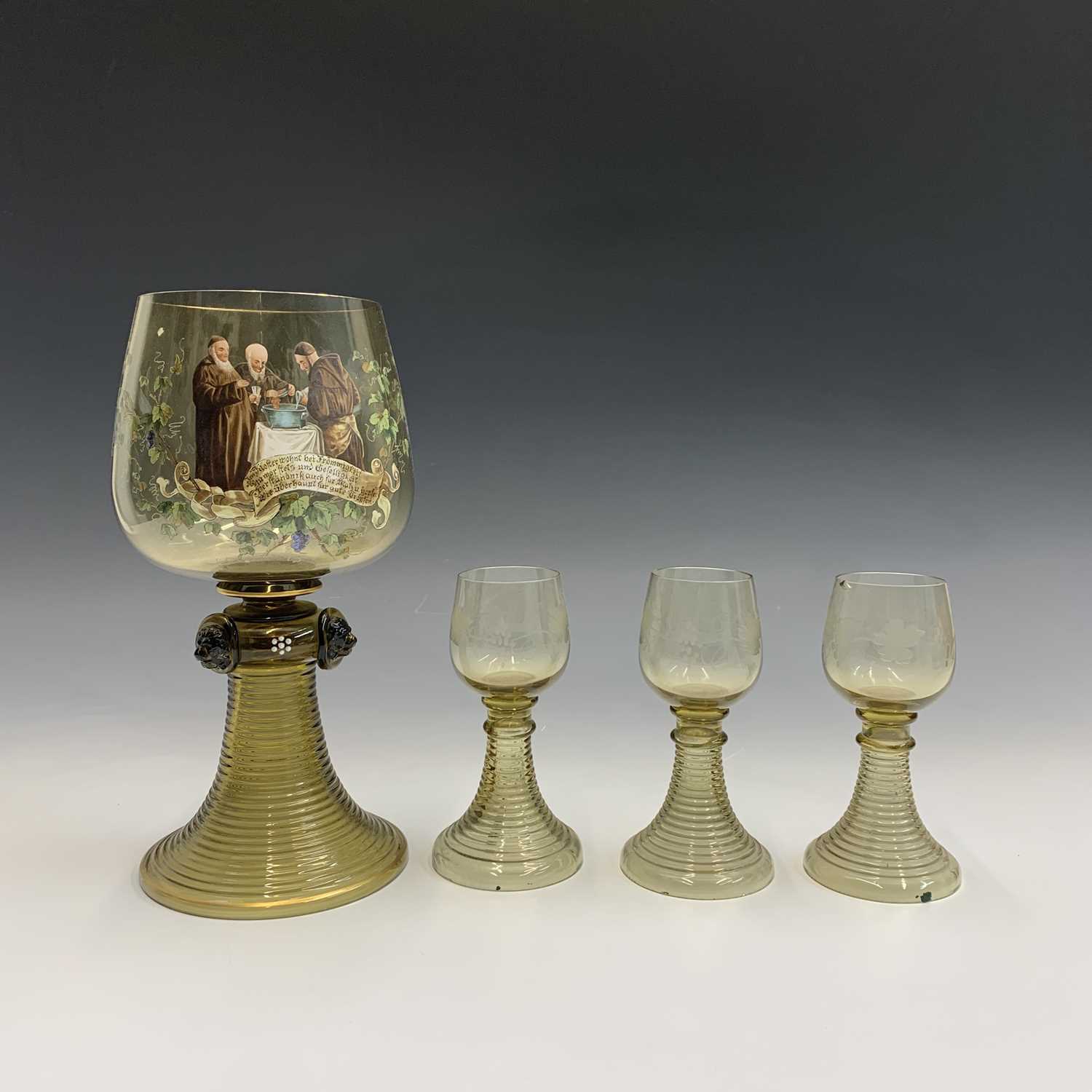 Lot 901 - An oversize German green hock glass, painted