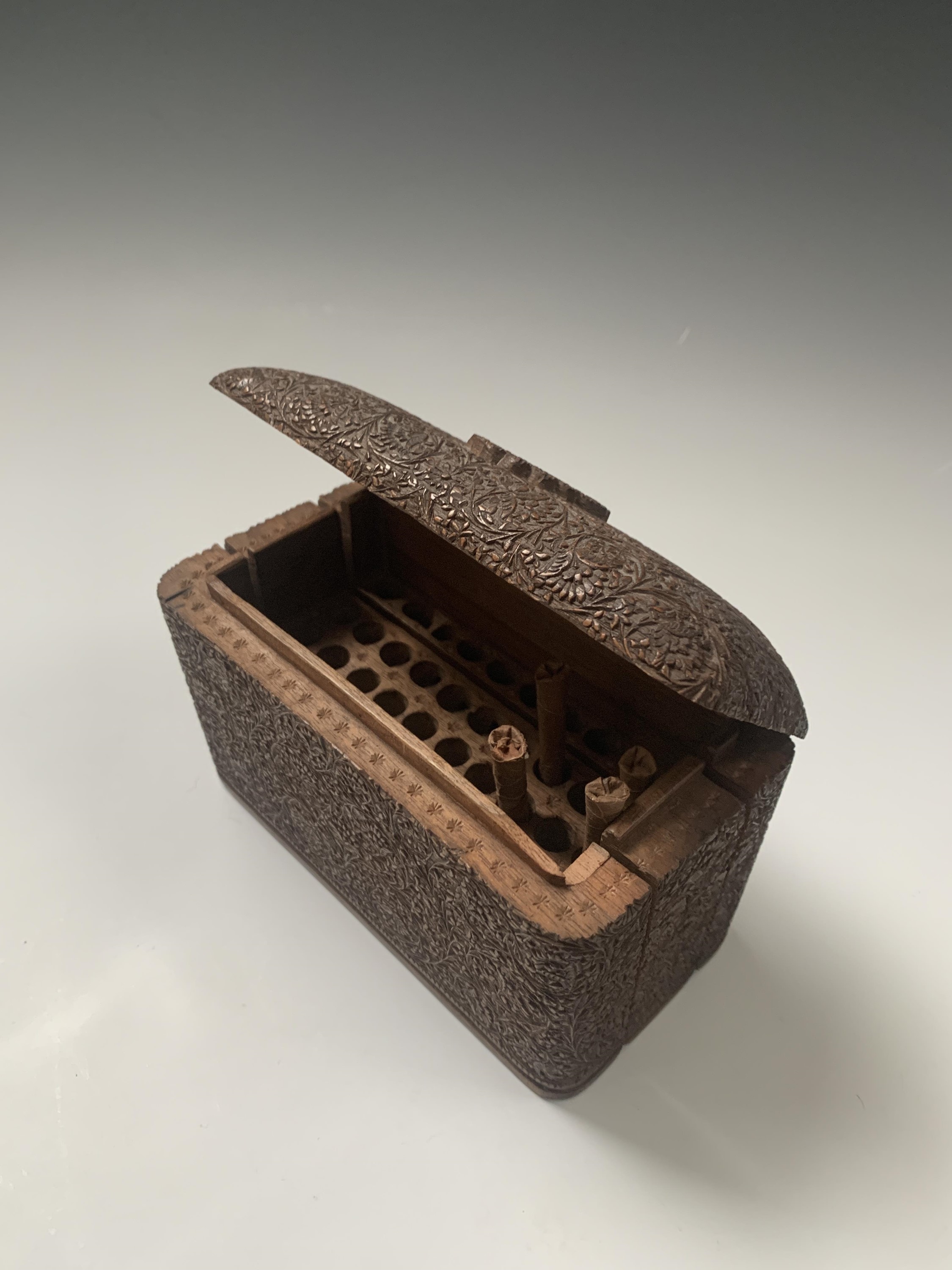 Lot 364 - An Indian carved sandalwood cigarette box,
