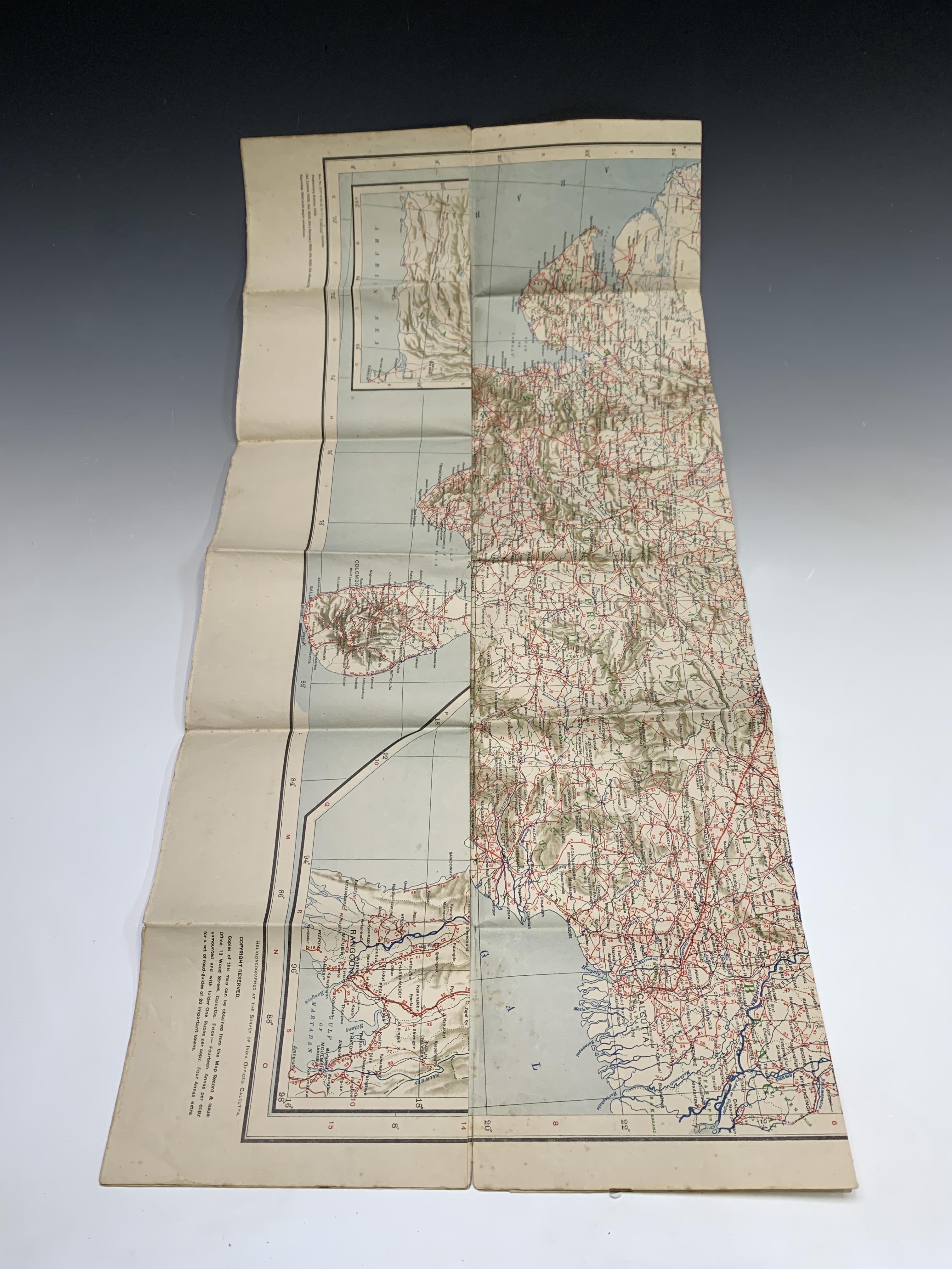 Lot 1248 - MAPS Four folding maps, including Road Map