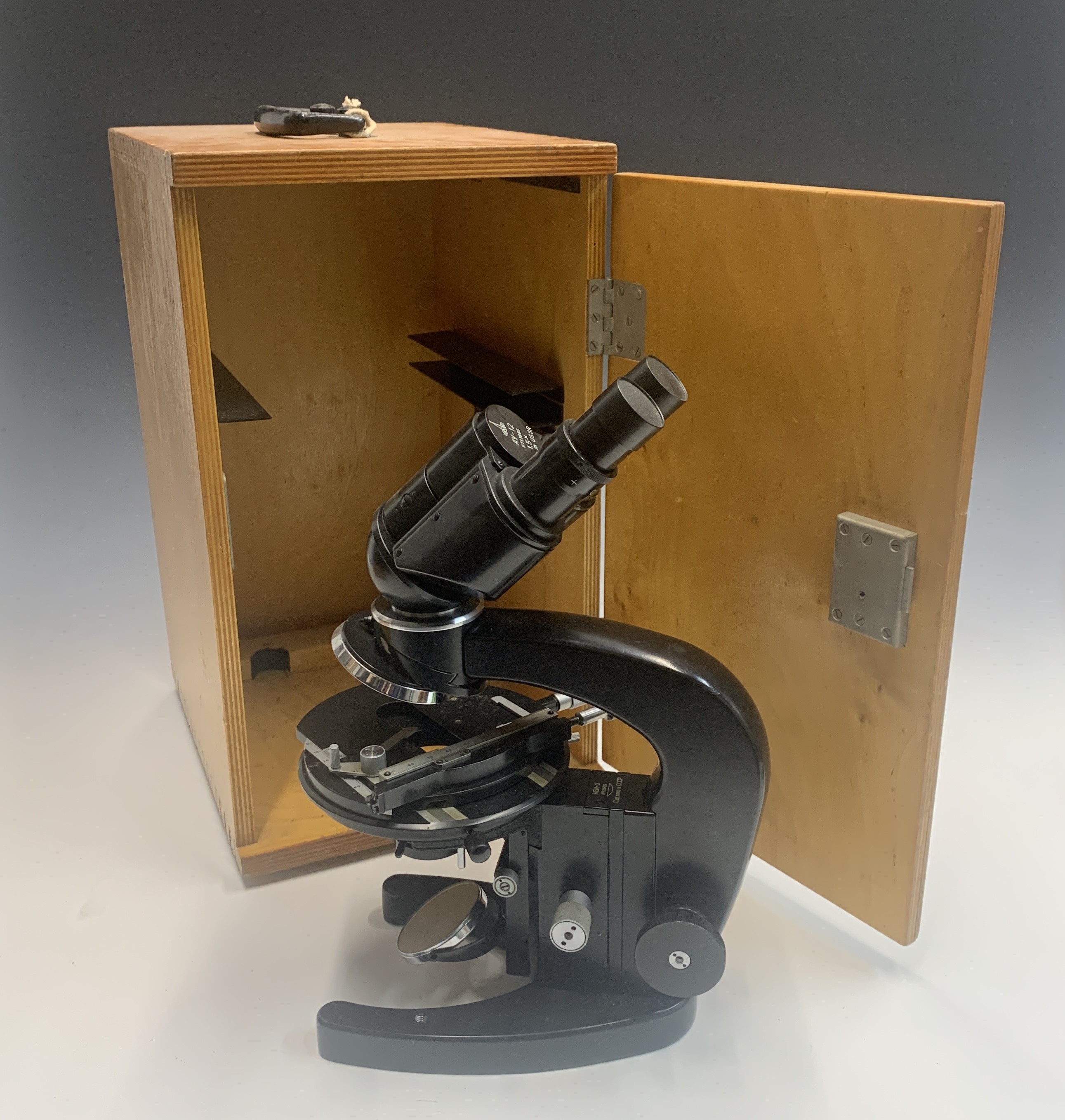 Lot 633 - A Russian OMO AY 12 microscope, with black
