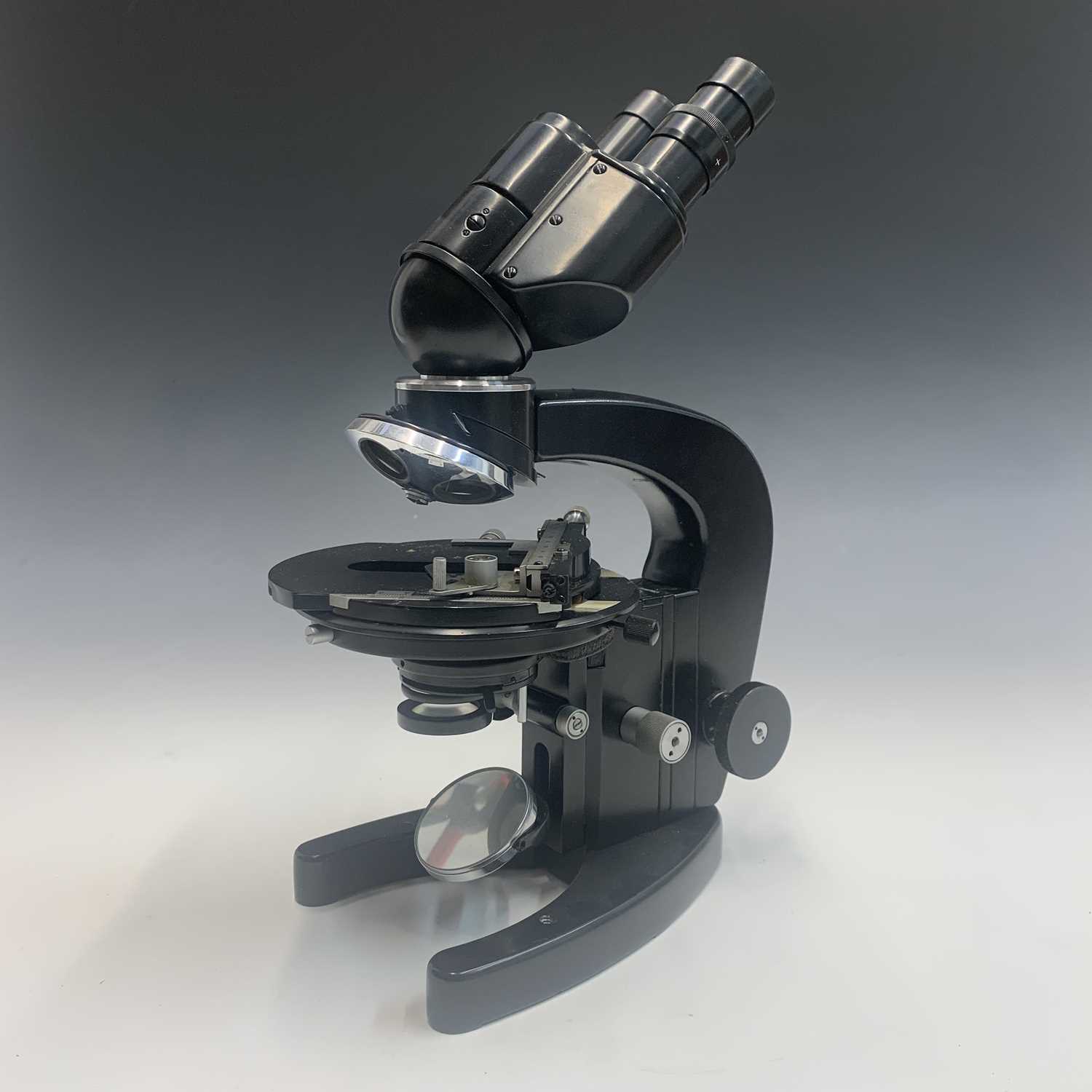 Lot 633 - A Russian OMO AY 12 microscope, with black