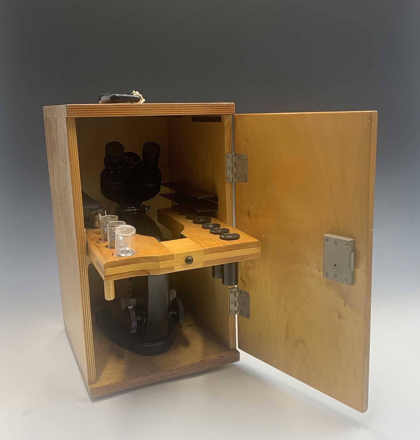 Lot 633 - A Russian OMO AY 12 microscope, with black