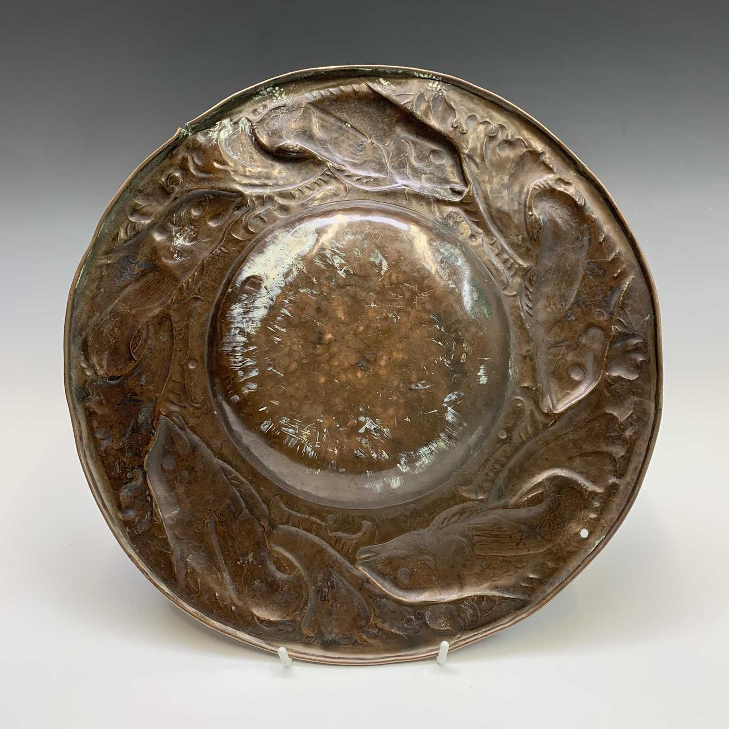 Lot 178 - A Newlyn copper charger, the border repousse