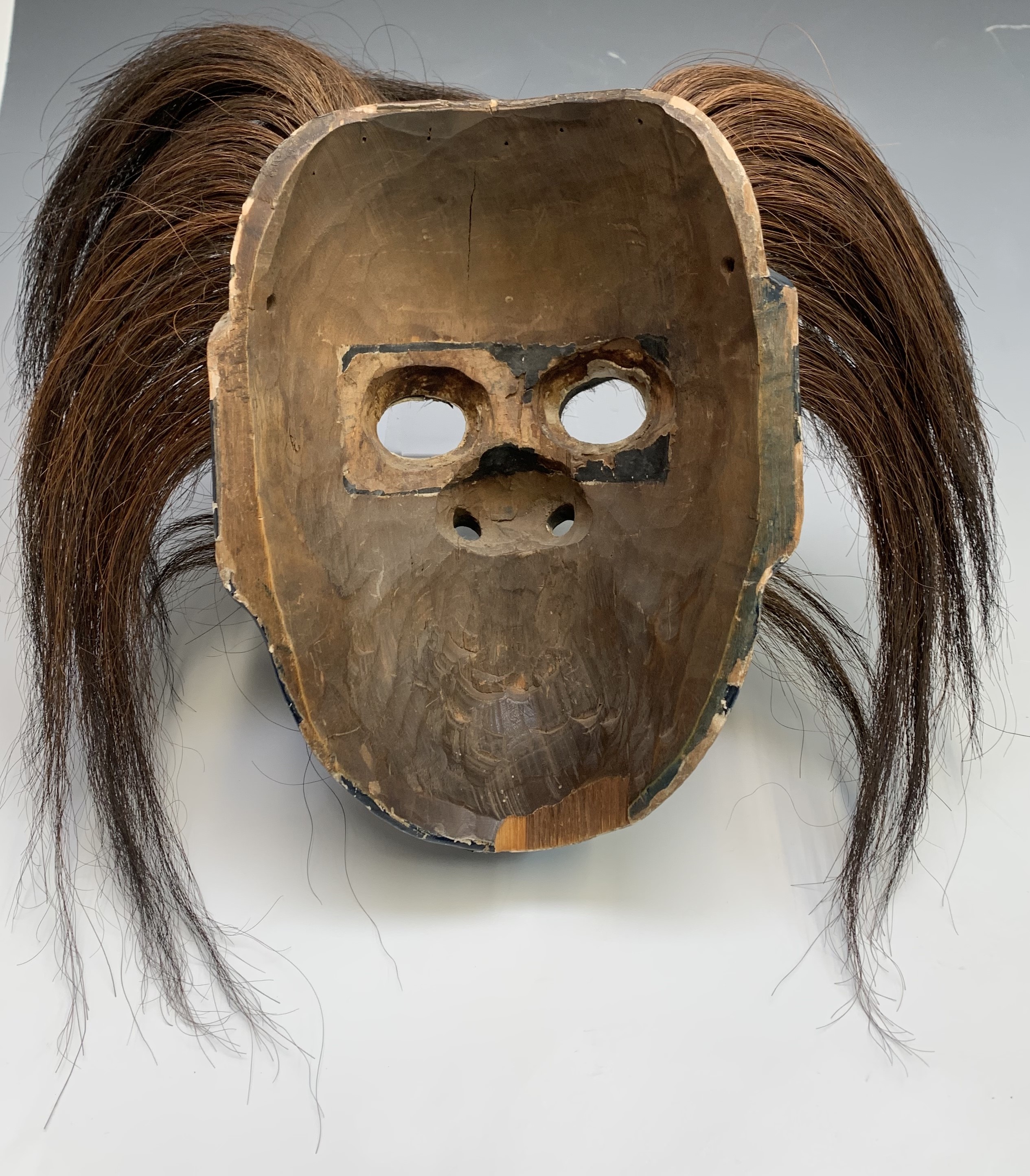 Lot 88 - A Japanese carved wooden painted mask, Meiji