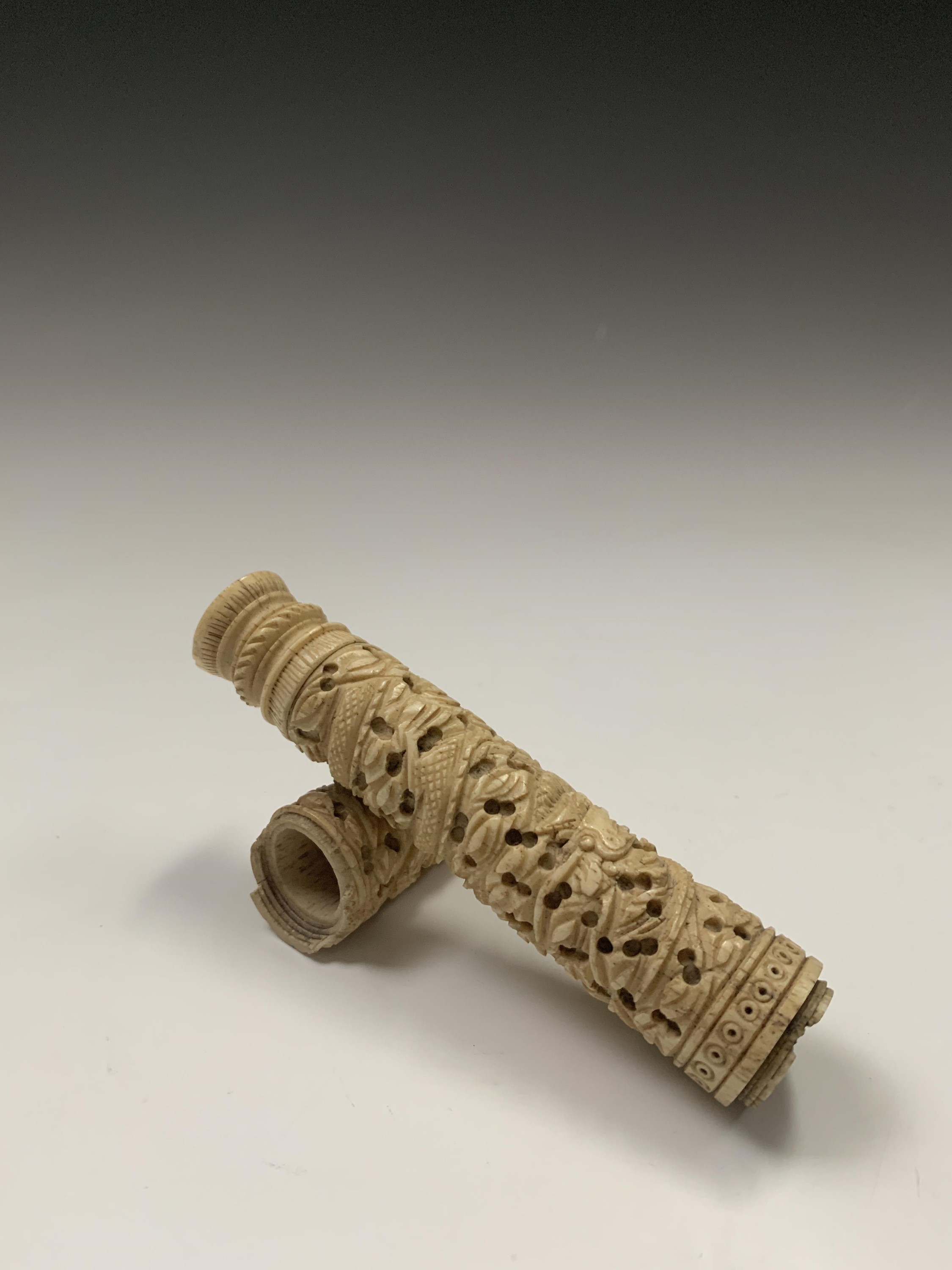 Lot 133 - A Chinese carved ivory part opium pipe, 19th