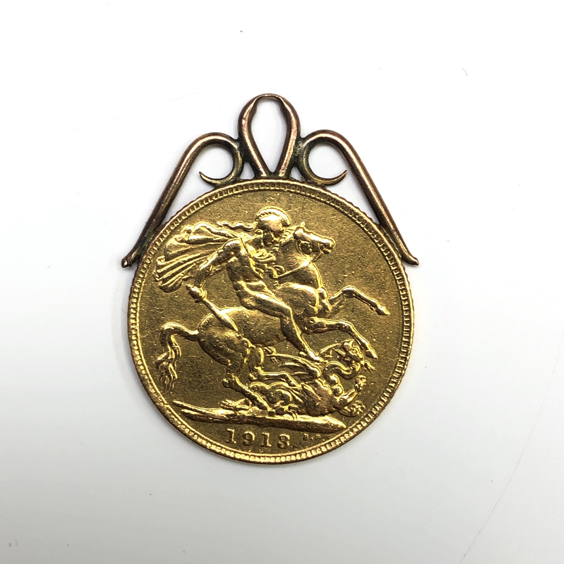 Lot 2491 - A 1913 sovereign with scrolling gold