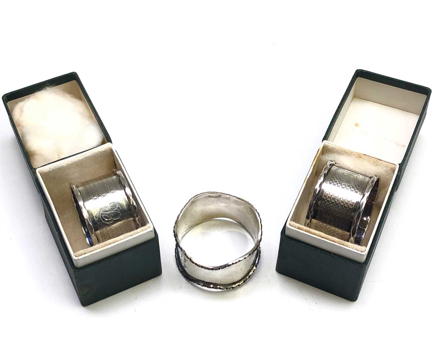 Lot 2008 - A pair of engine turned silver napkin rings