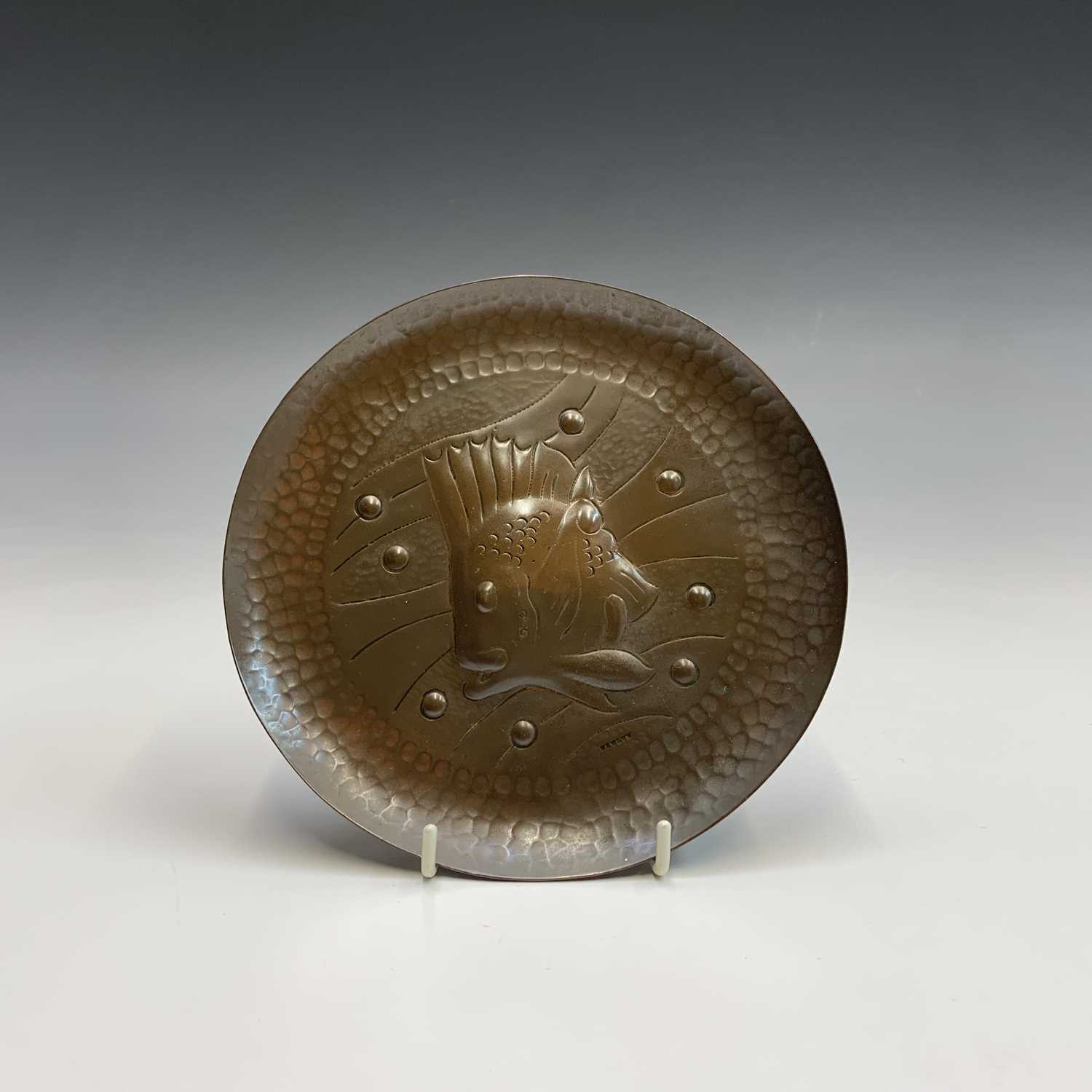 Lot 374 - A Newlyn copper tray of circular form