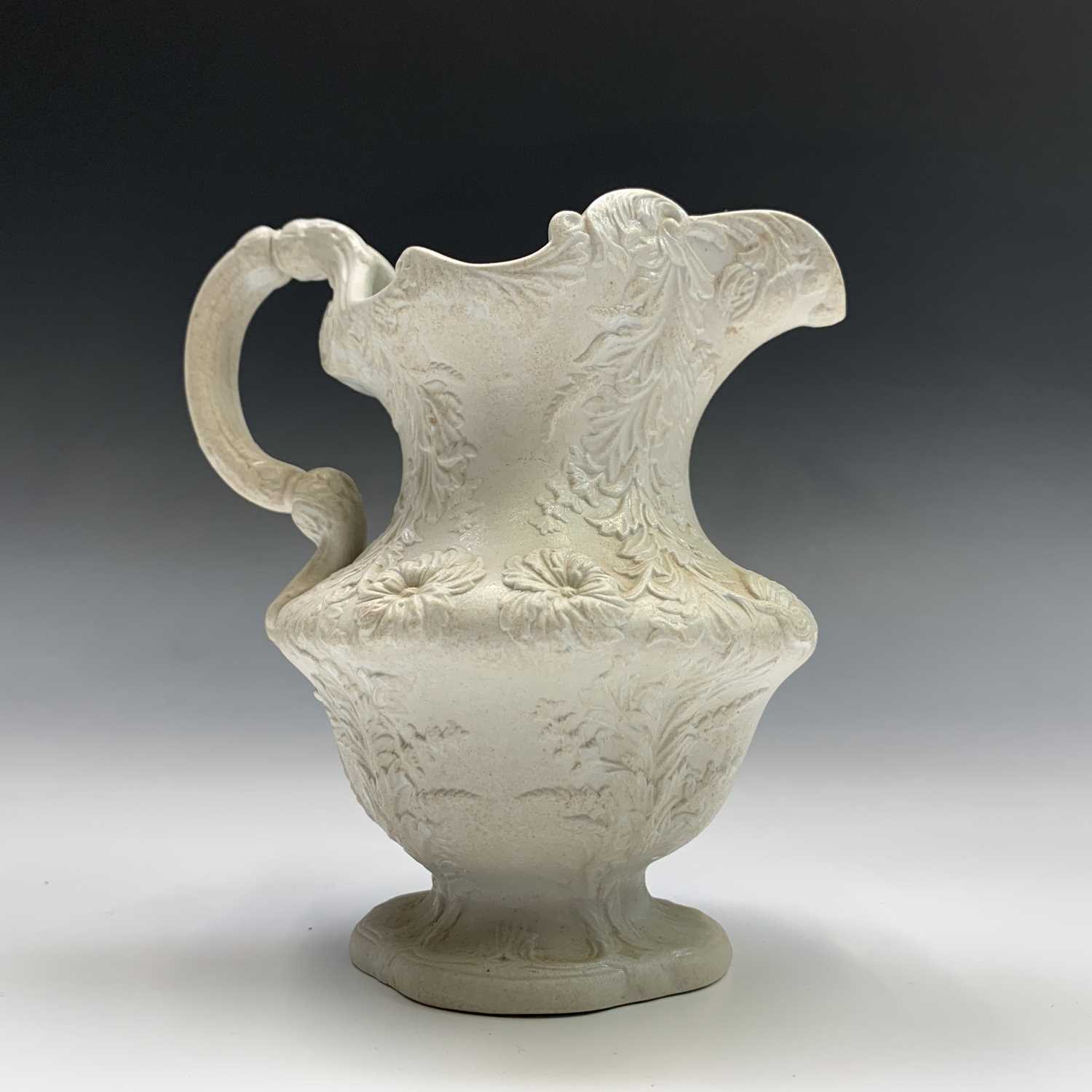 Lot 1059 - A Charles Meigh white jug. Height 14.5cm.