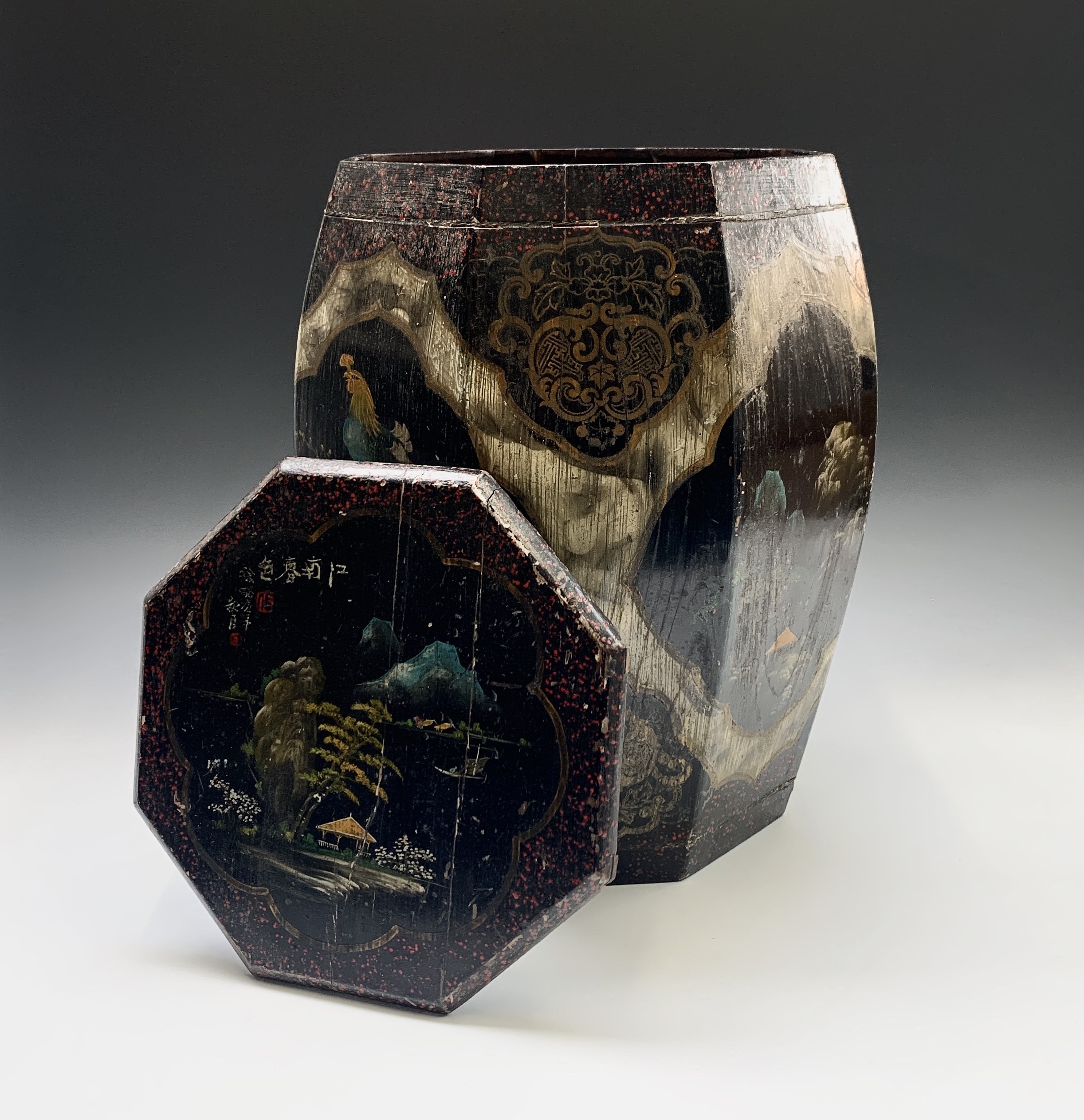 Lot 234 - A Japanese black lacquer octagonal barrel in