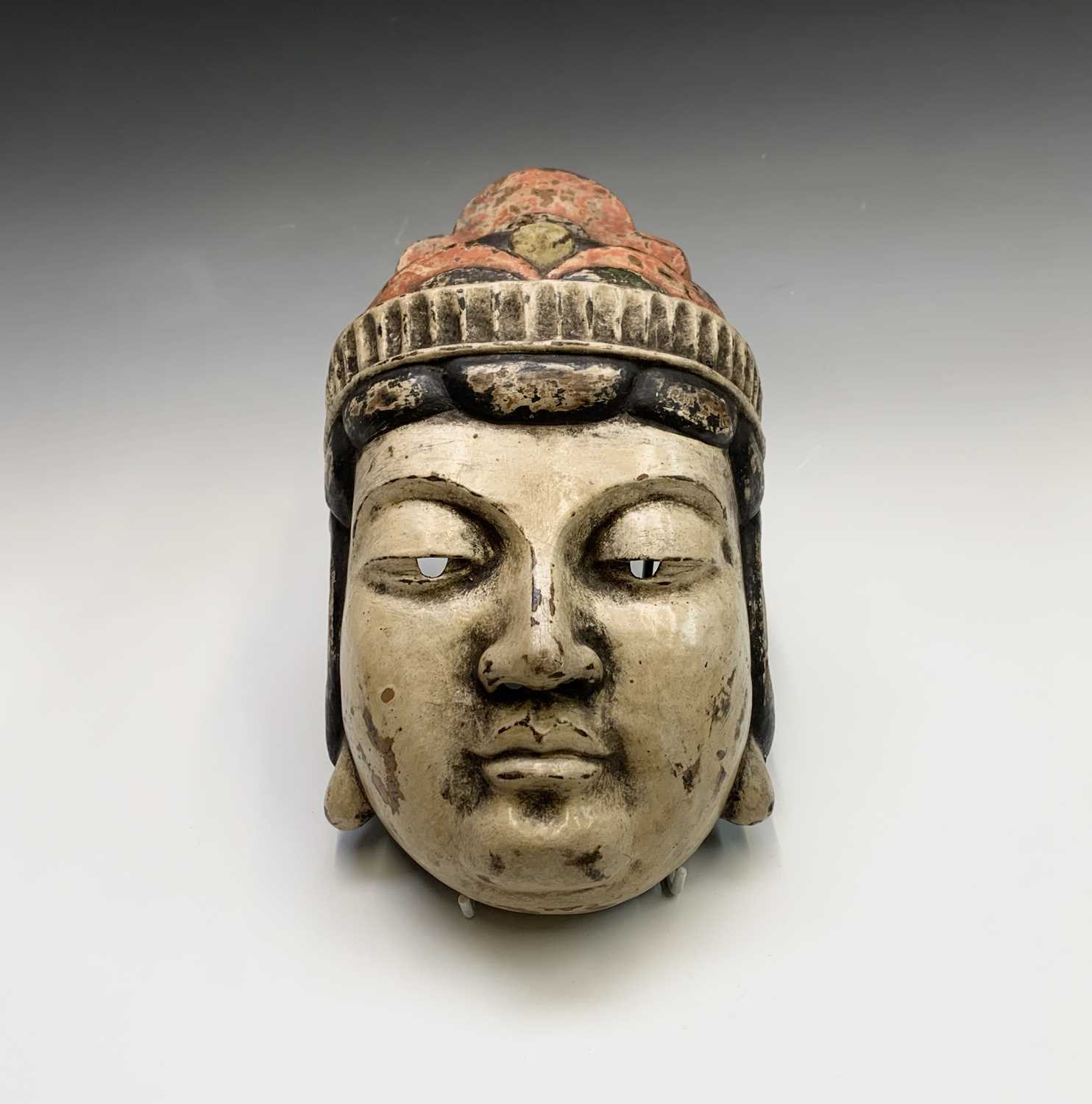 Lot 287 - A Japanese papier mache mask, attached paper