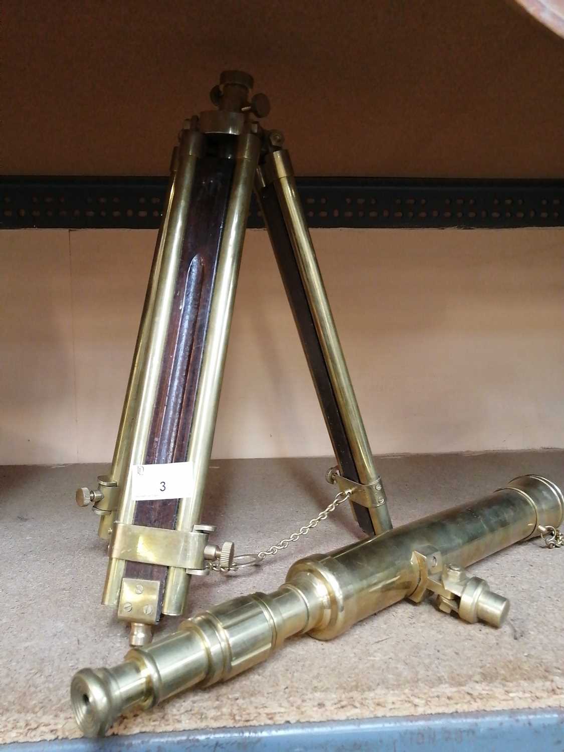 Lot 3 - A brass telescope with a matching brass and