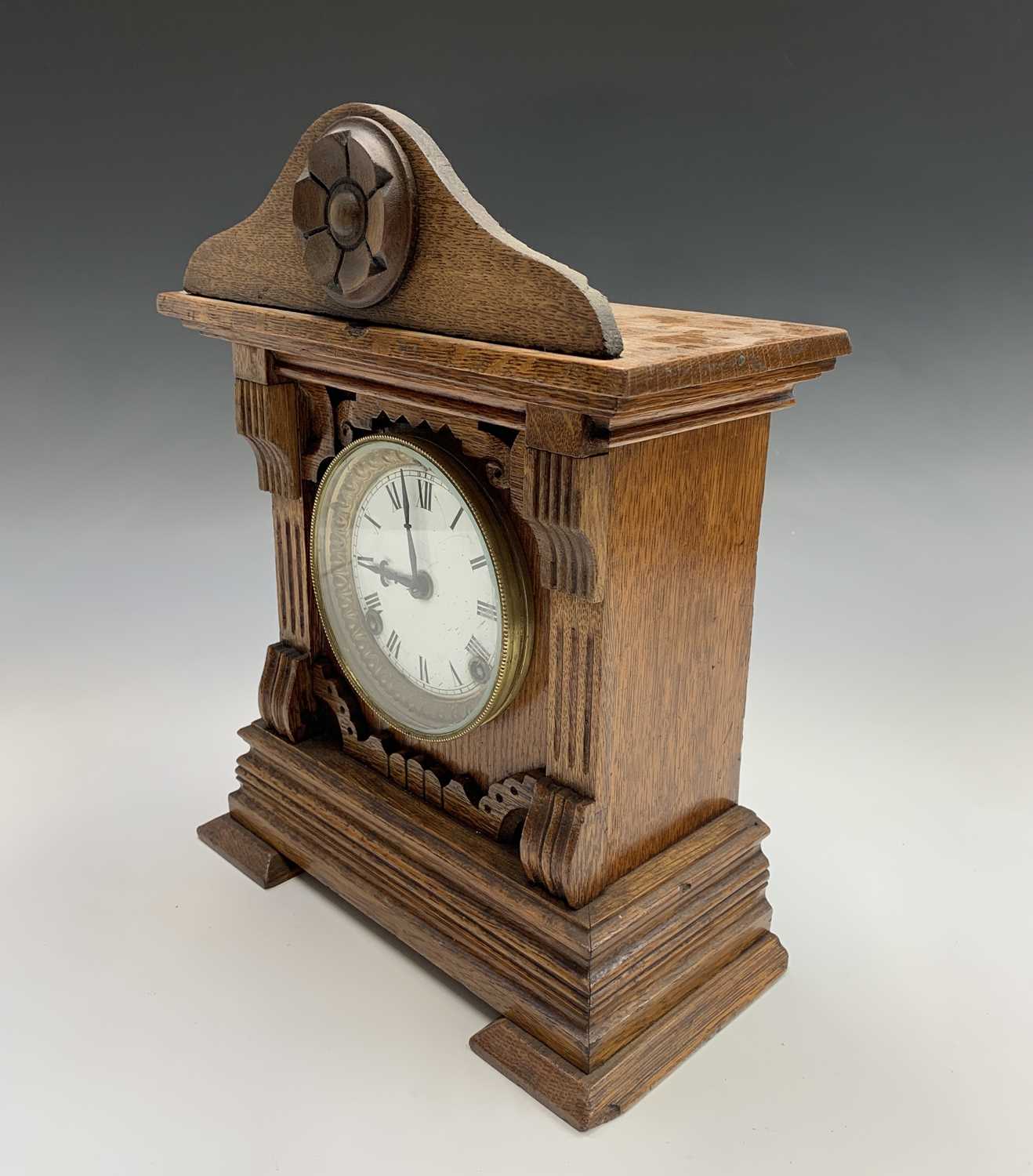 Lot 2917 - A late Victorian oak cased mantel clock,