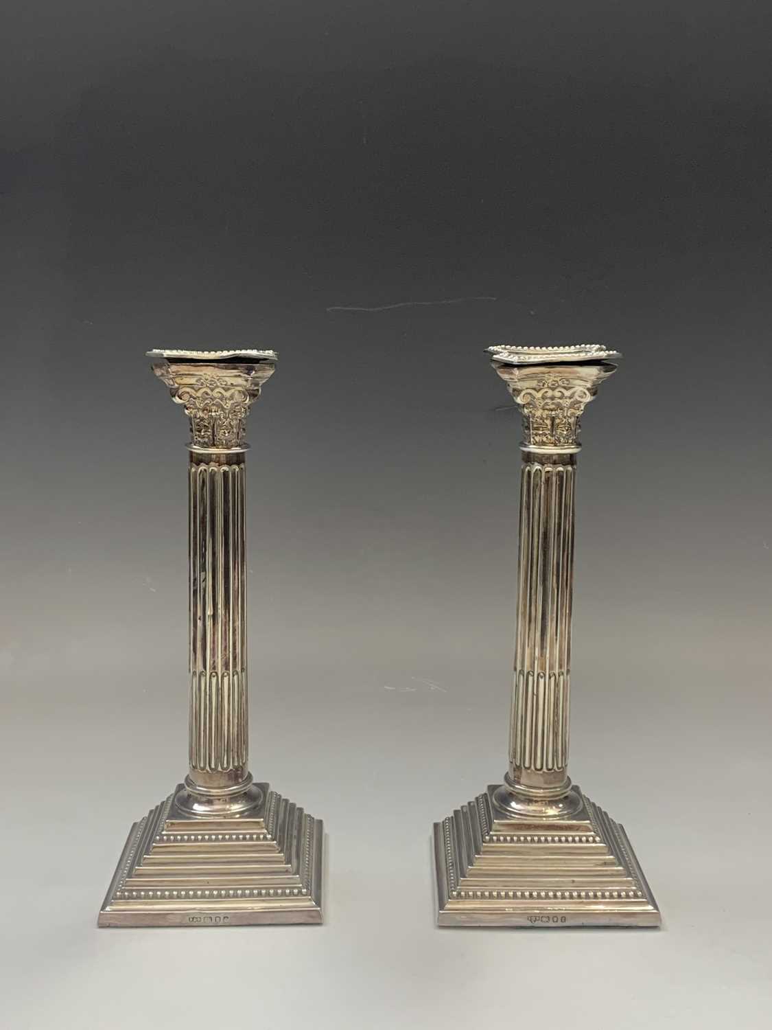 Lot 155 - A pair of filled silver classical column