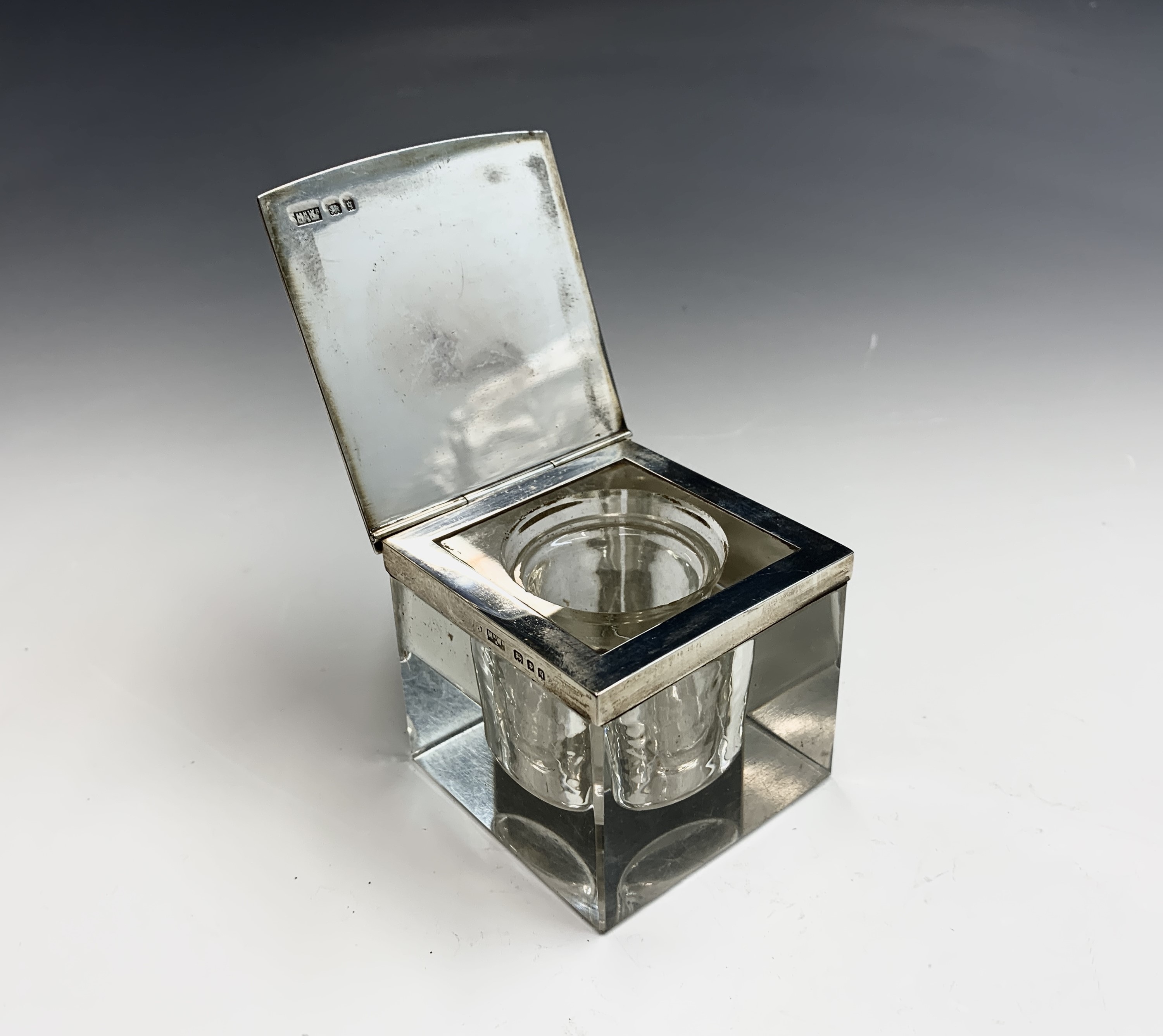 Lot 117 - A cut square glass inkwell with heavy art