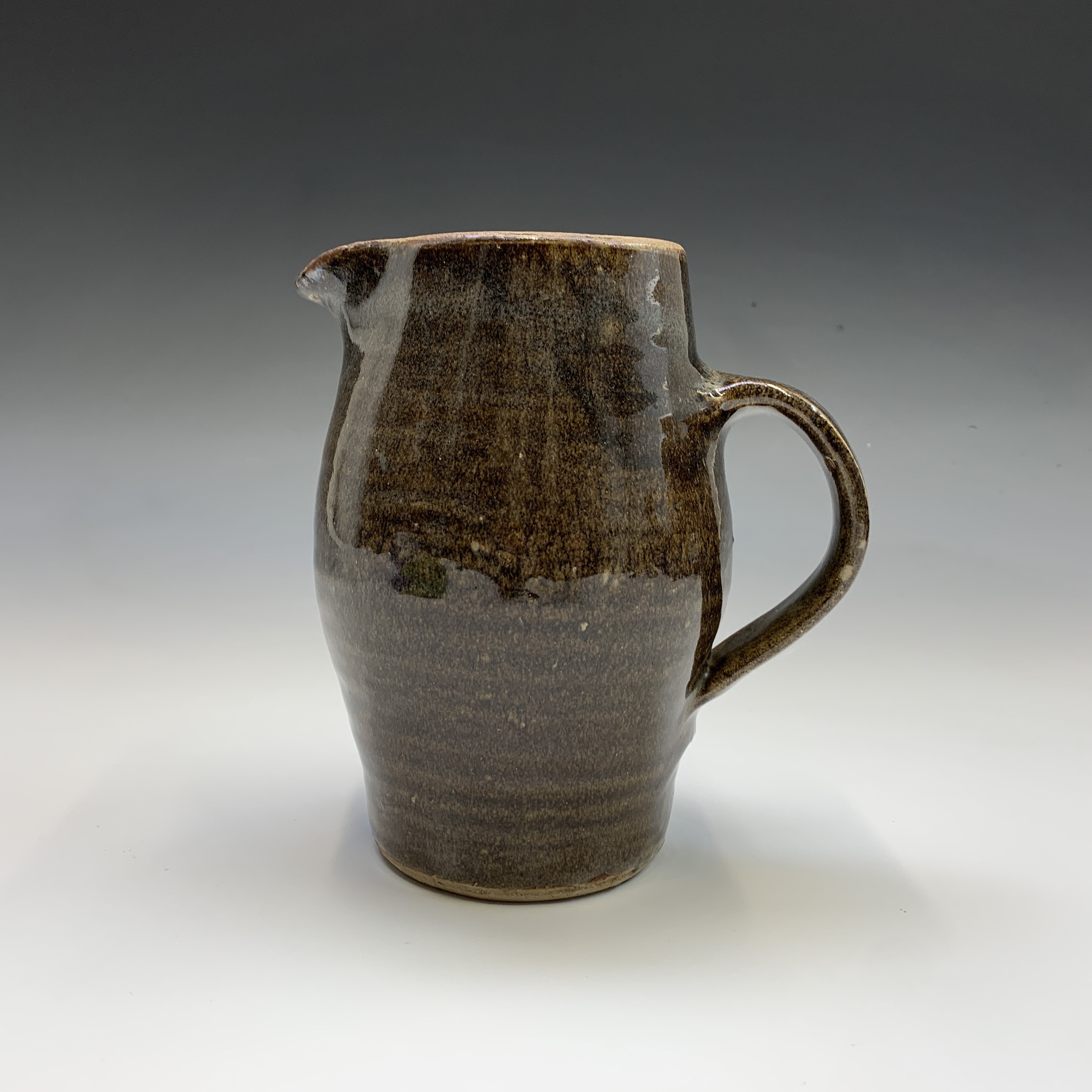 Lot 426 - A Leach Pottery, St Ives standard ware jug.