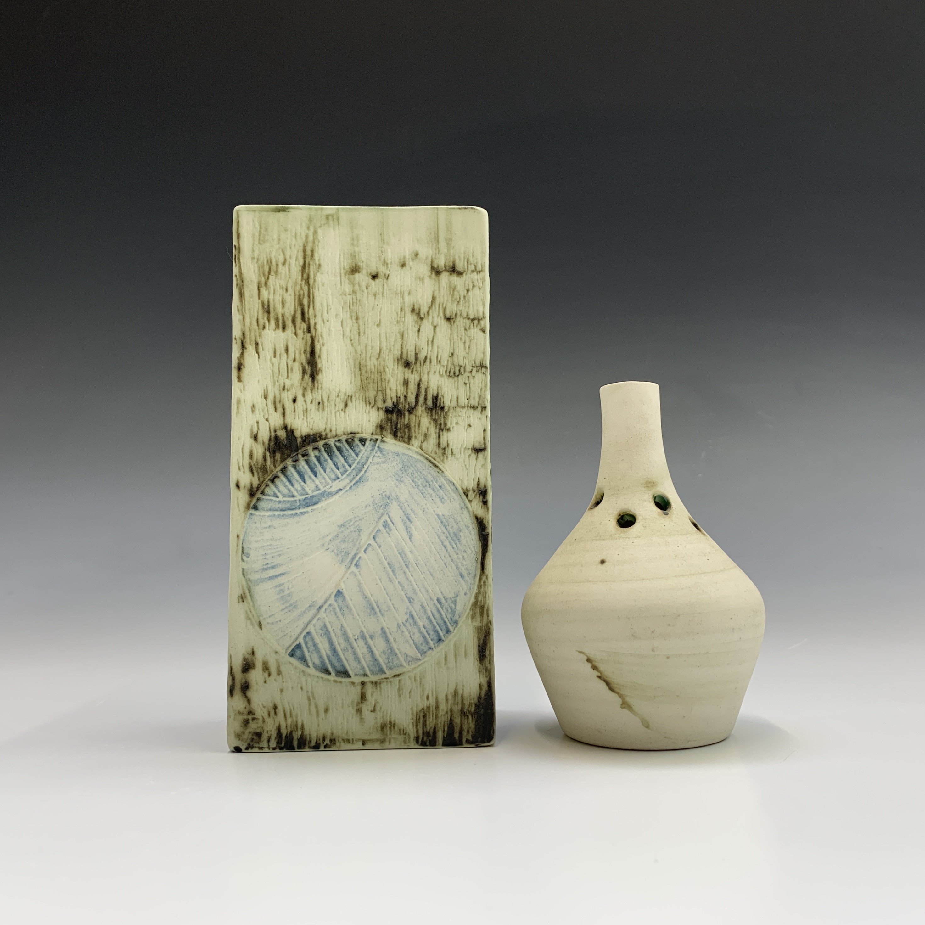 Lot 1102 - A Carn pottery rectangular slab sided vase