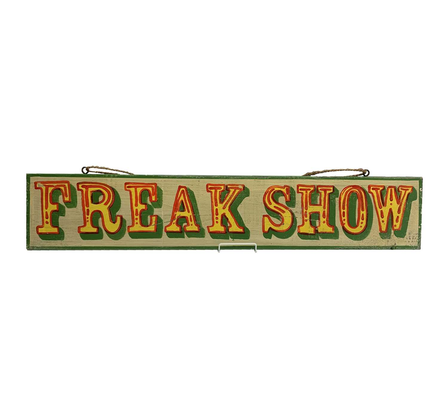 Lot 136 - A signwritten wooden sign 'FREAK SHOW',