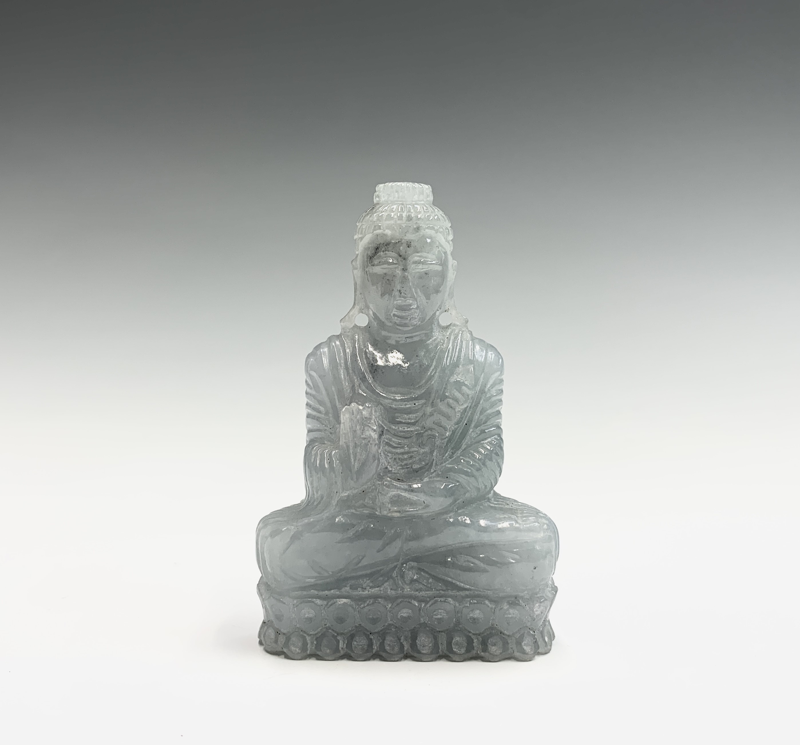 Lot 254 - A Chinese greenstone figure of Buddha, 20th