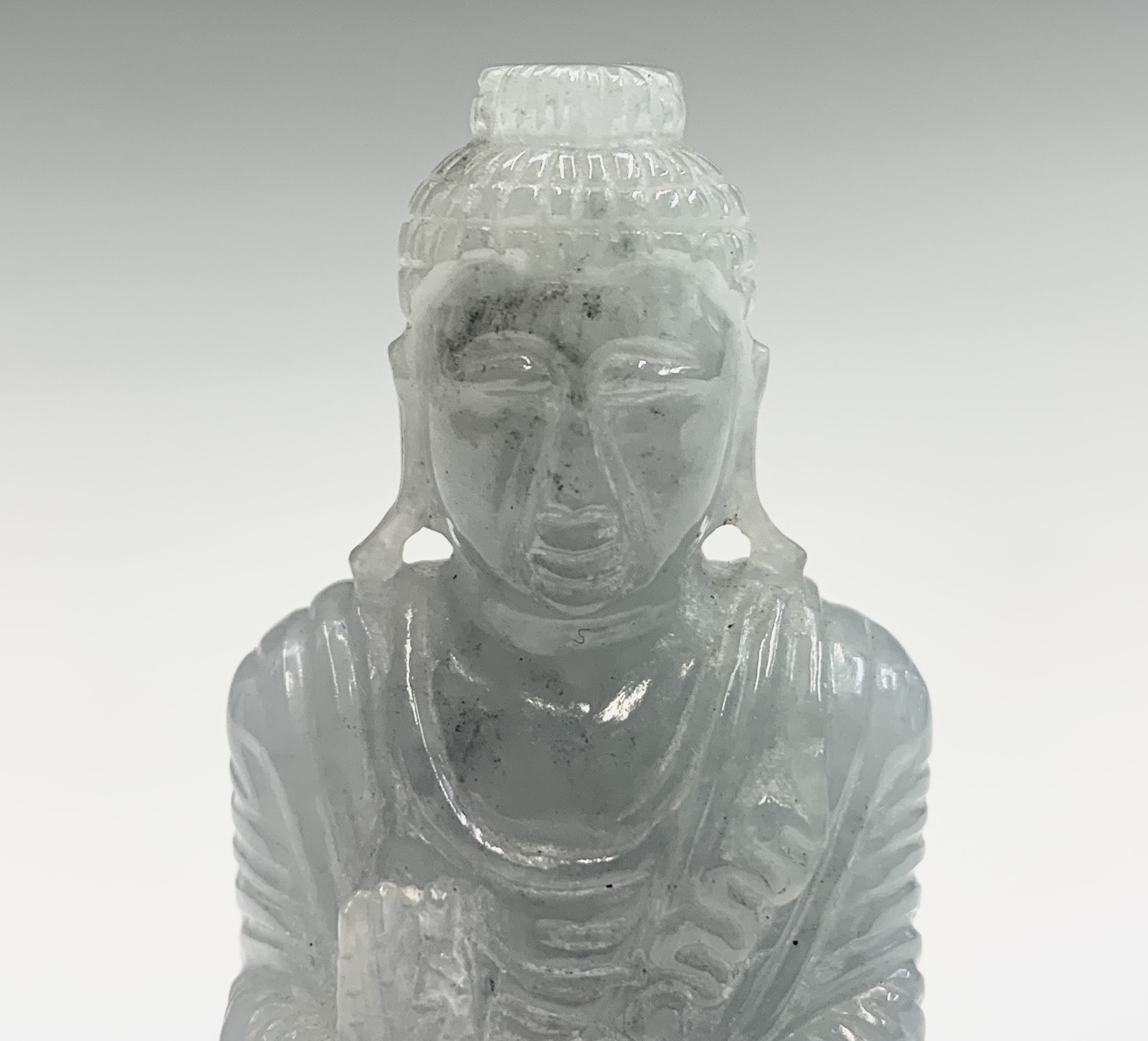 Lot 254 - A Chinese greenstone figure of Buddha, 20th