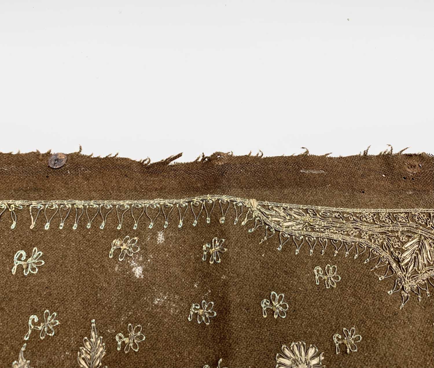 Lot 1045 - An Indian embroidered gold metal thread