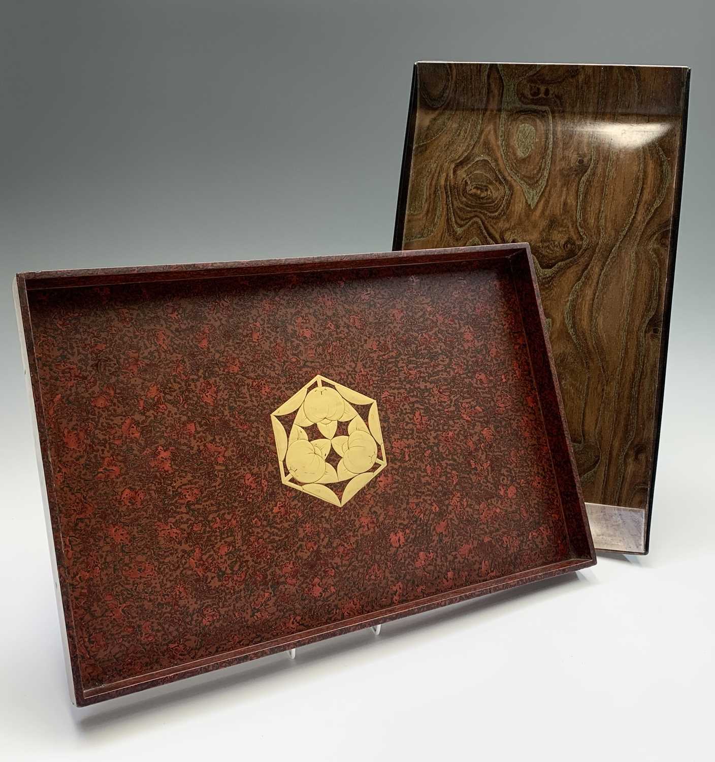 Lot 107 - A Japanese red lacquer tray, with gilt
