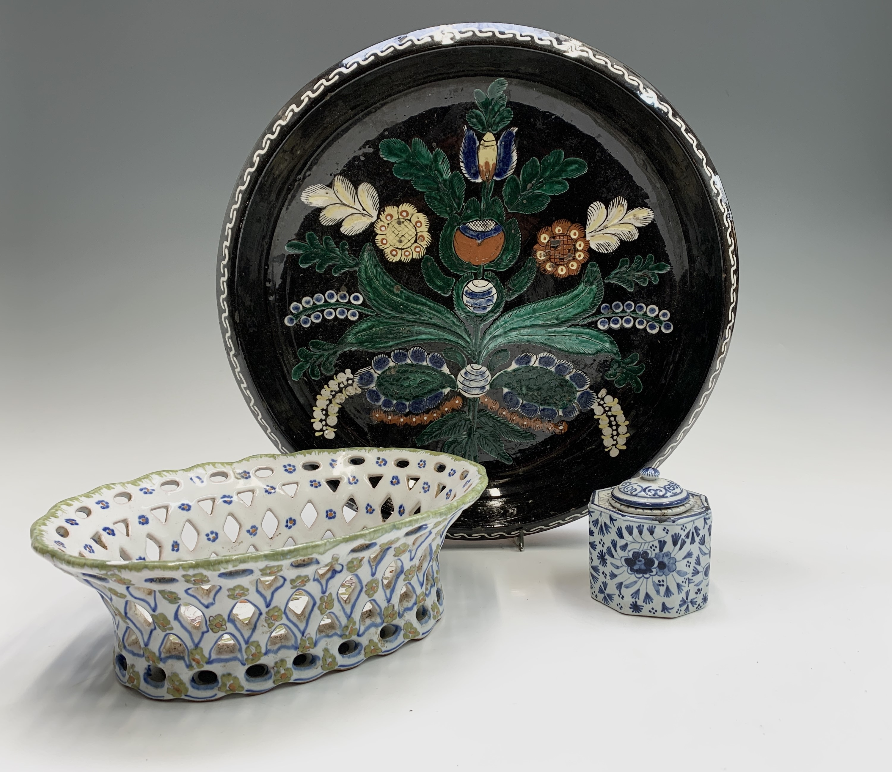 Lot 1043 - A Heimberg folk pottery large dish, painted