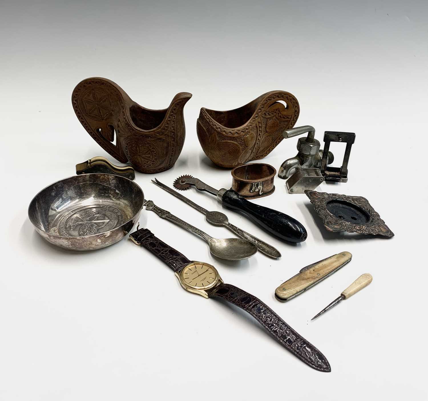 Lot 230 - Two chip carved Scandinavian treen jugs,