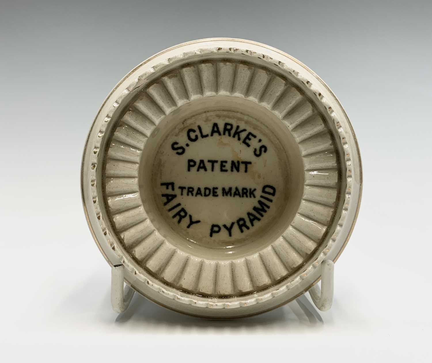 Lot 1053 - An S Clarke's patent fairy pyramid pottery