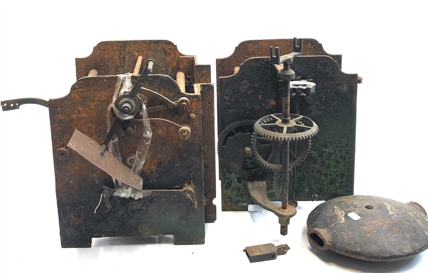 Lot 3034 - A 19th century iron turret clock, in two