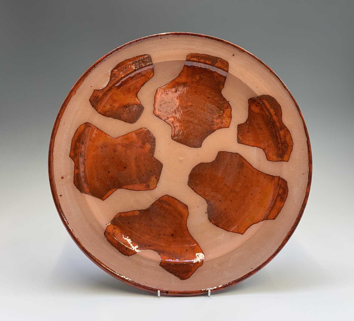 Lot 884 - A Graham Fern (Porthleven) pottery charger,