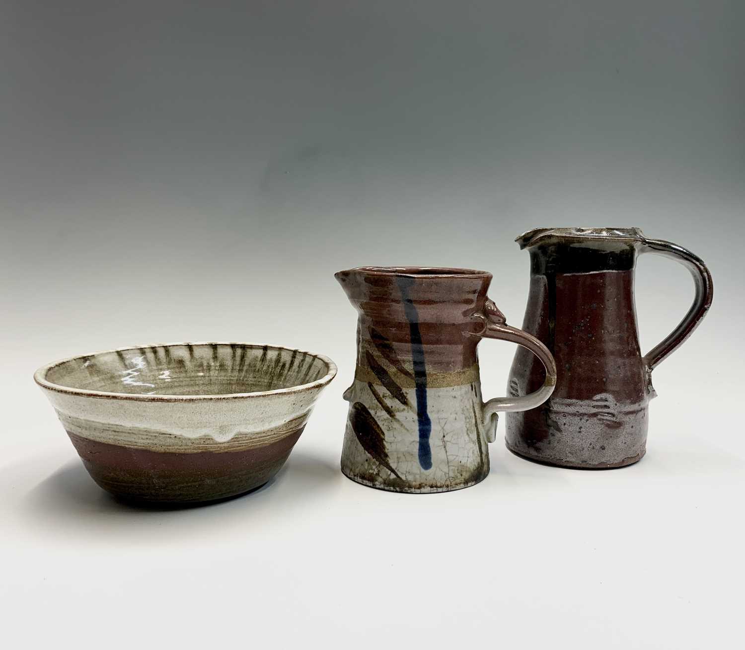 Lot 1102 - A Tim Lake studio pottery jug, height 19cm,