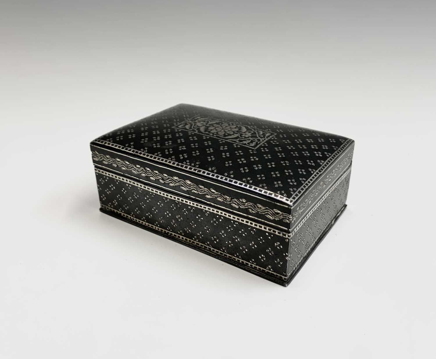 Lot 507 - A small Indian Bidri silver inlaid box.