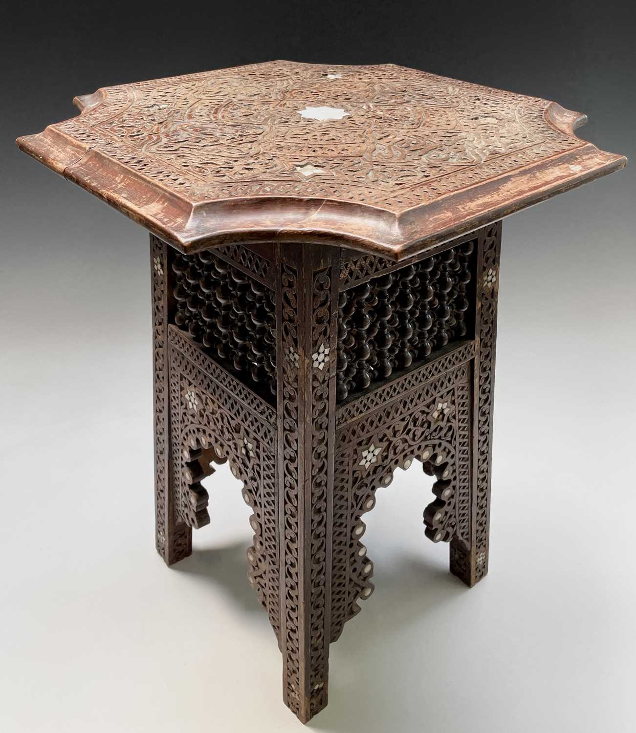 Lot 1015 - A Syrian carved wood occasional table, 19th
