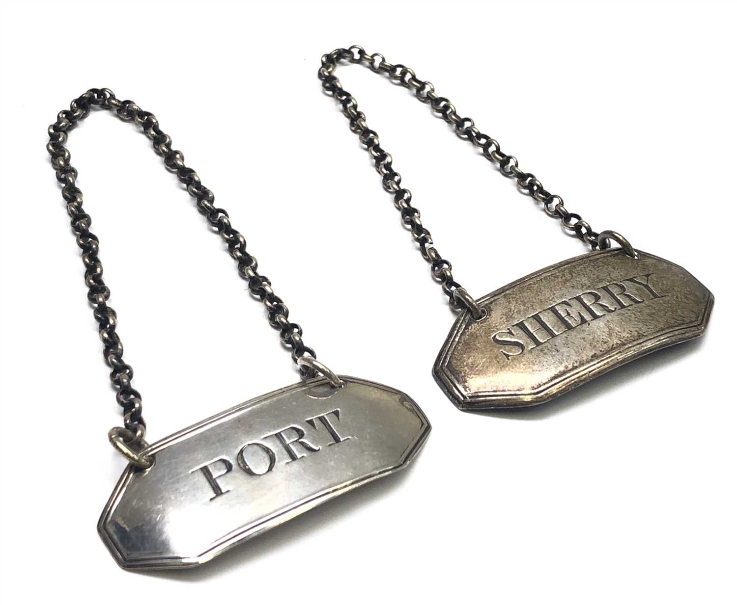 Lot 2194 - A pair of silver port and sherry labels by