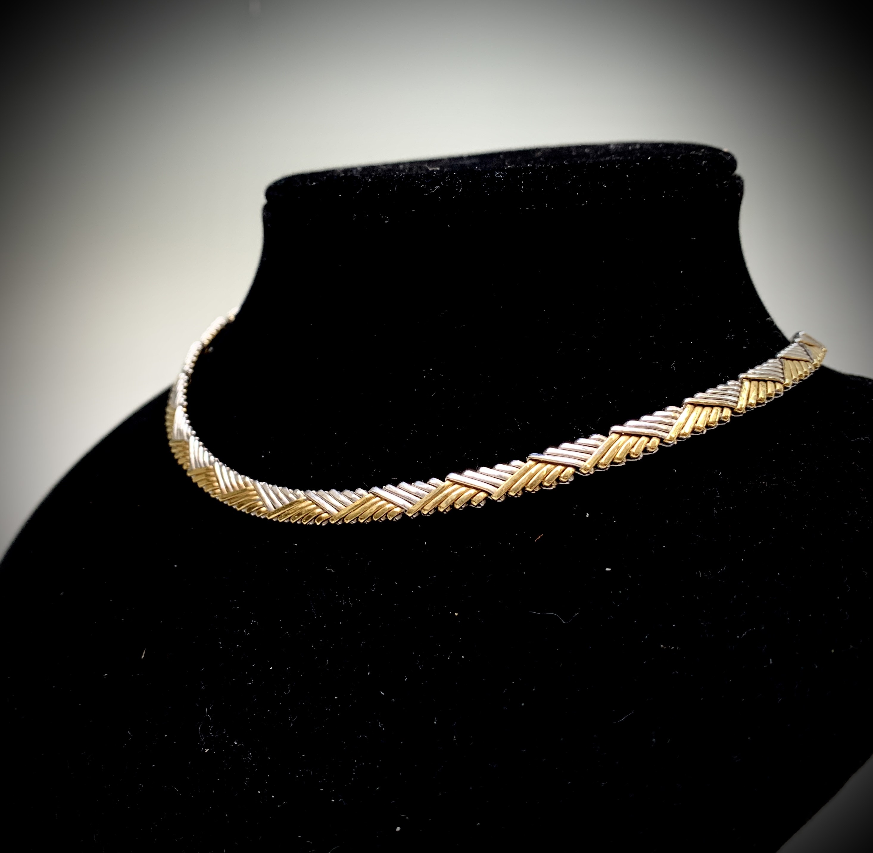 Lot 854 - A contemporary 18ct two-colour gold weave