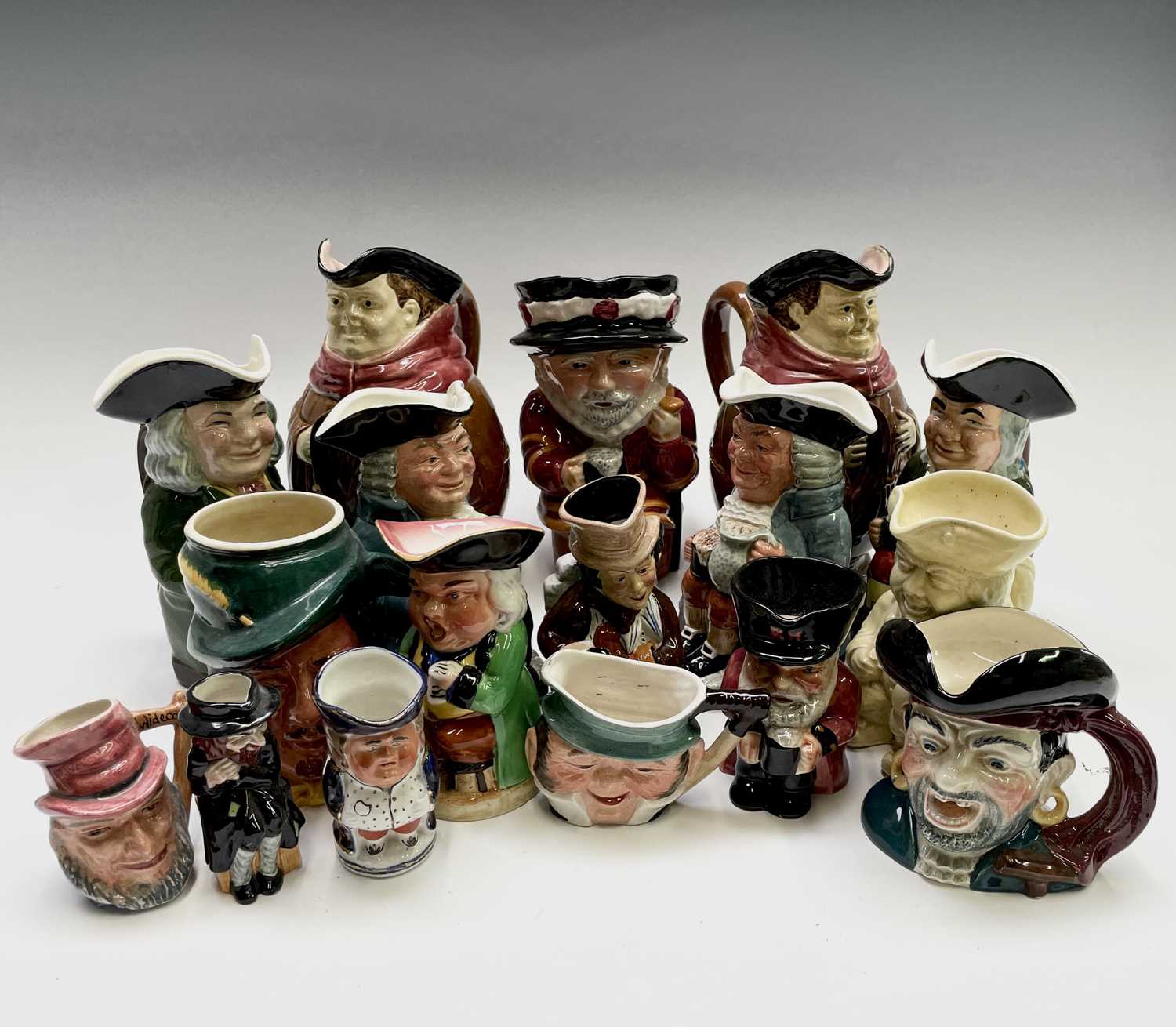 Lot 847 - A collection of pottery character and toby