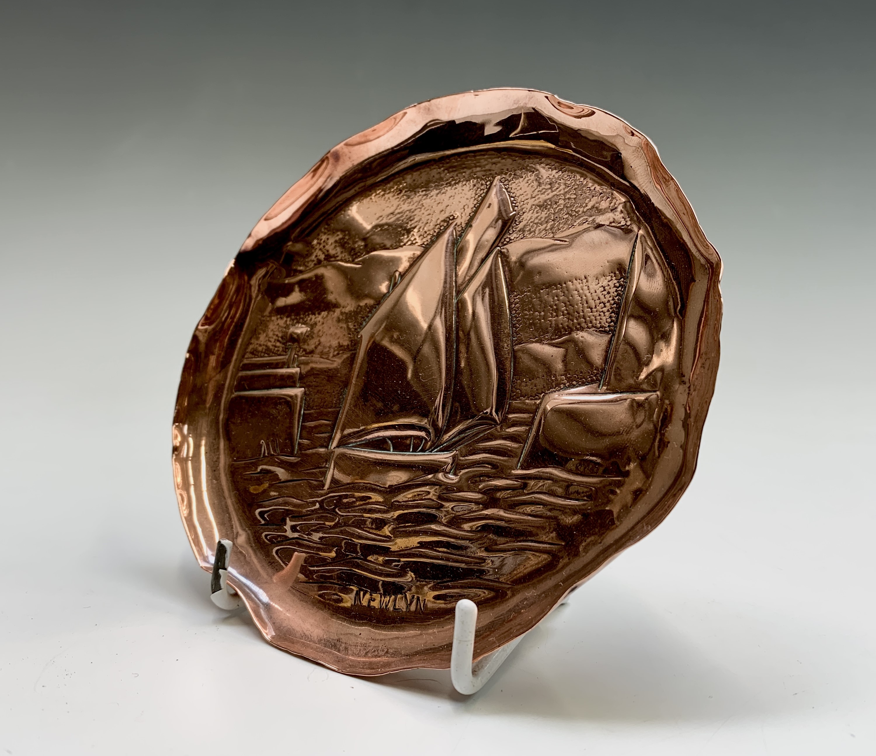 Lot 3 - A Newlyn copper small circular tray, repousse