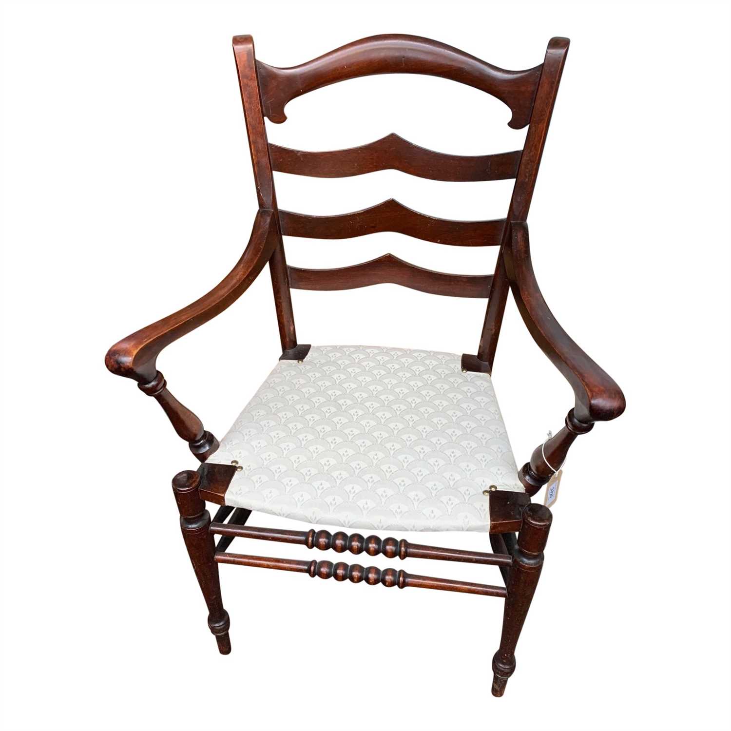 Lot 3320 - An Edwardian ladderback open armed chair.