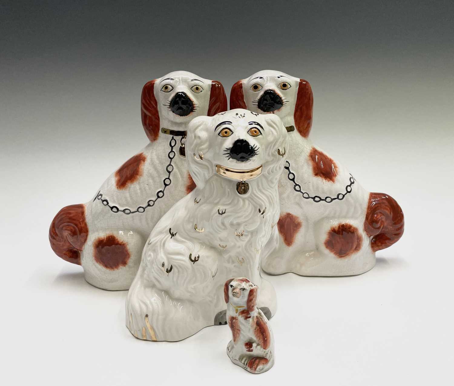 Lot 870 - A miniature Victorian Staffordshire spaniel