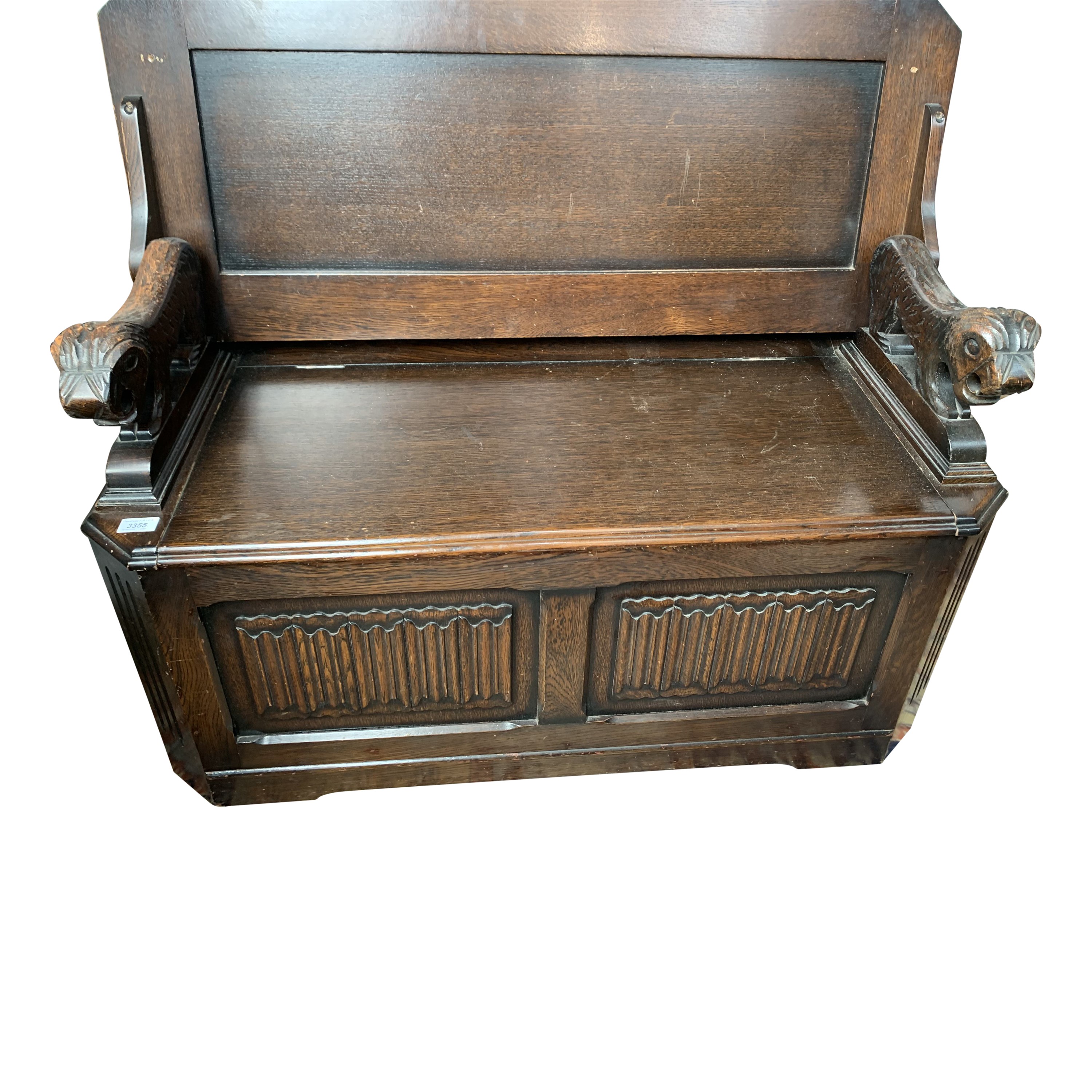 Lot 3355 - An oak monks bench, 20th century, with